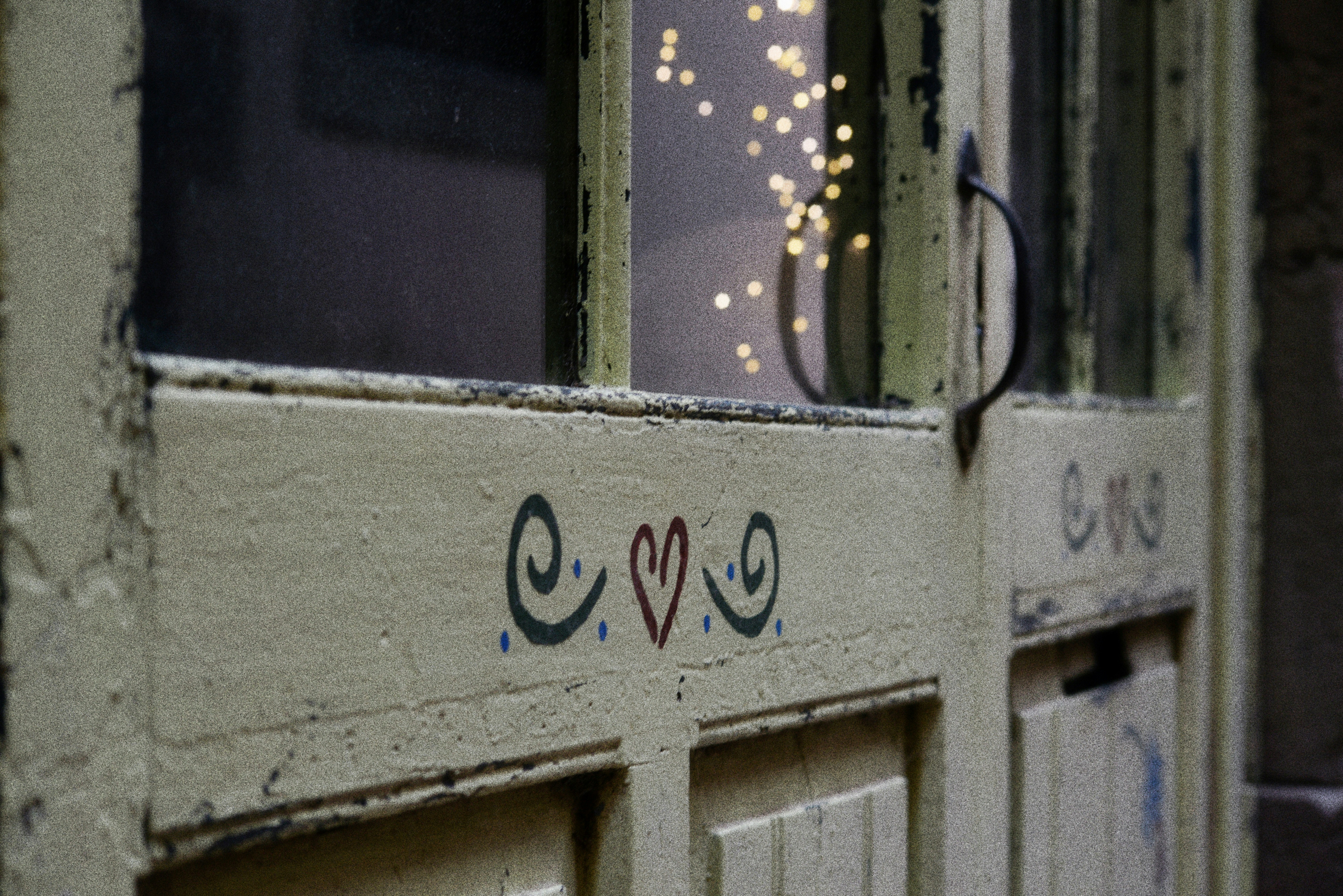 Charmed Fragments: Weathered Doors Framed by Soft Lights