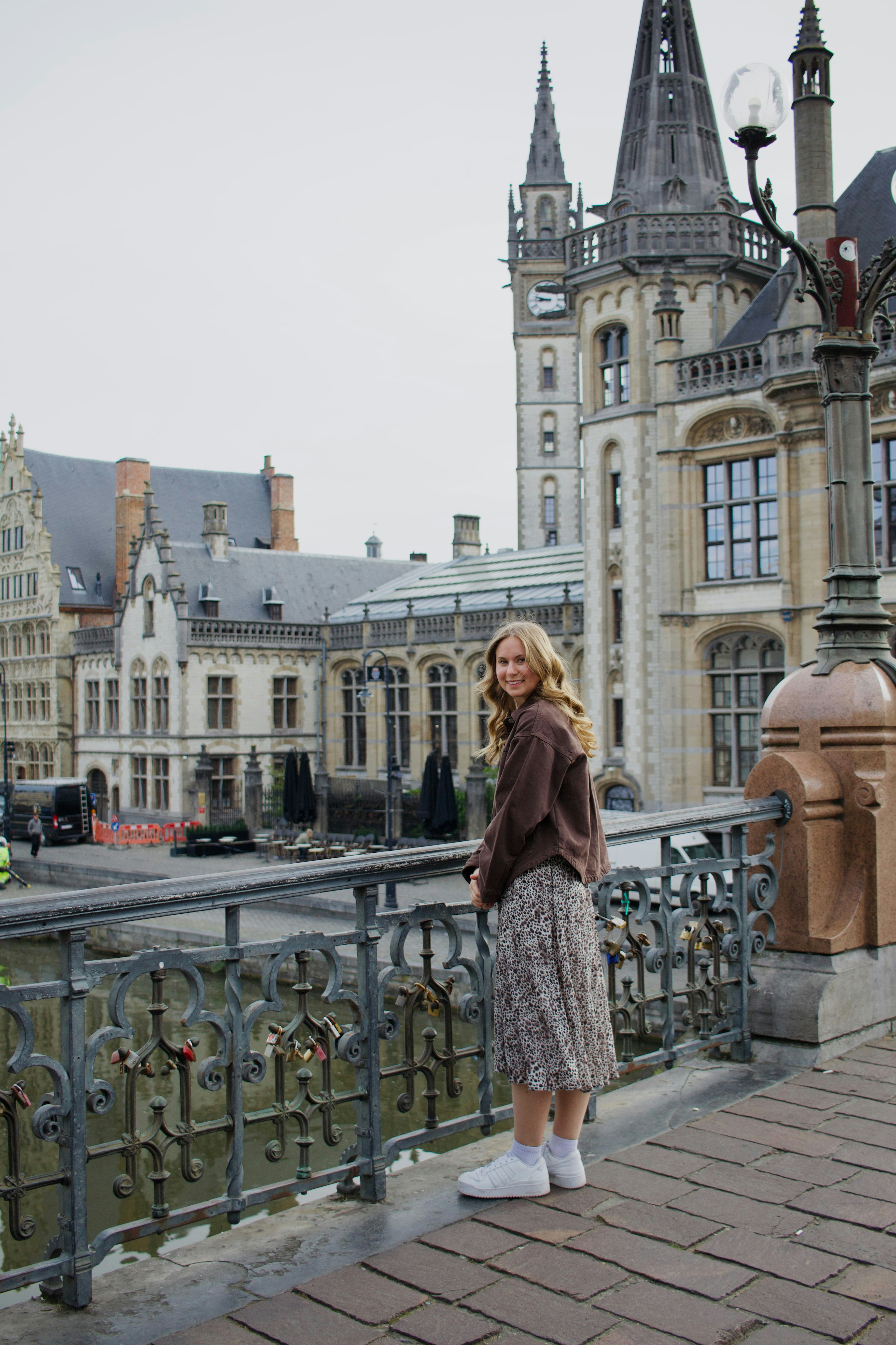 Portrait on the Bridge Over a Historic Flemish Row