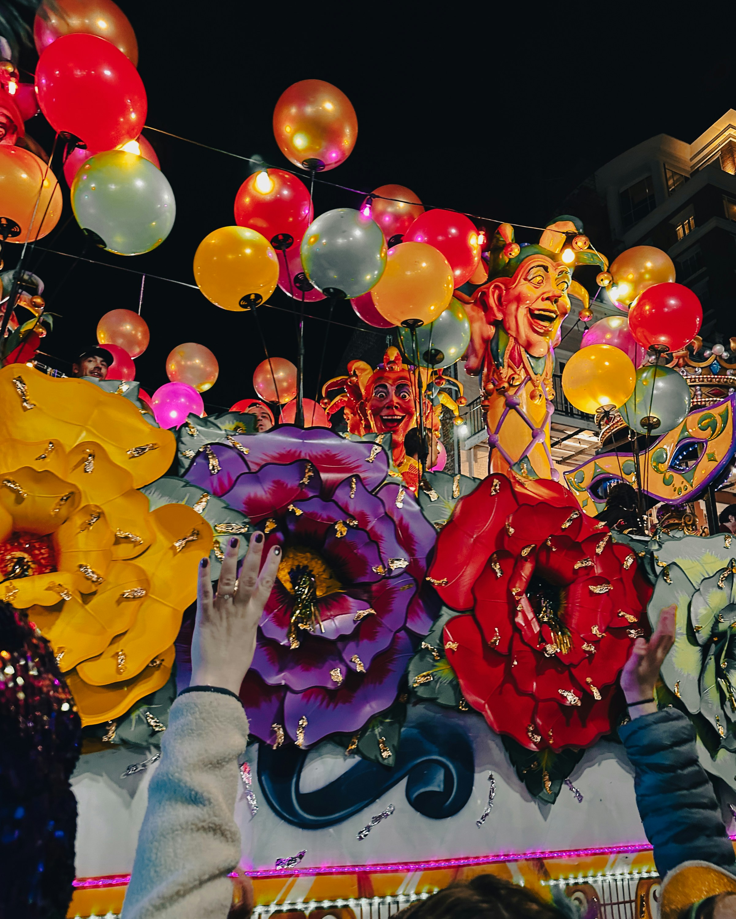 Night Carnival Parade: Close-Up of Lively Floats and Balloons