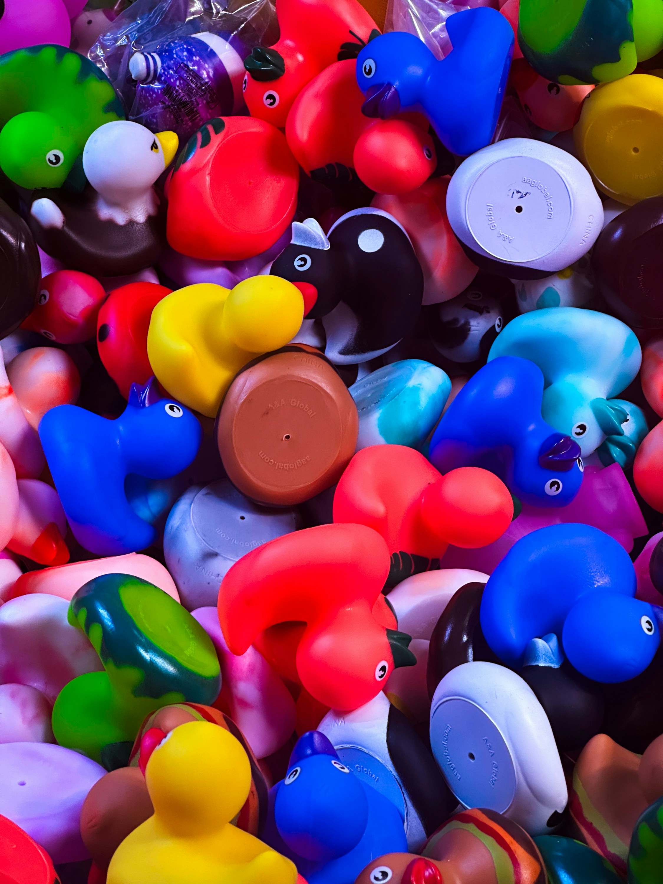 Colorful Playground: A Conglomerate of Rubber Duckies in a Burst of Hue