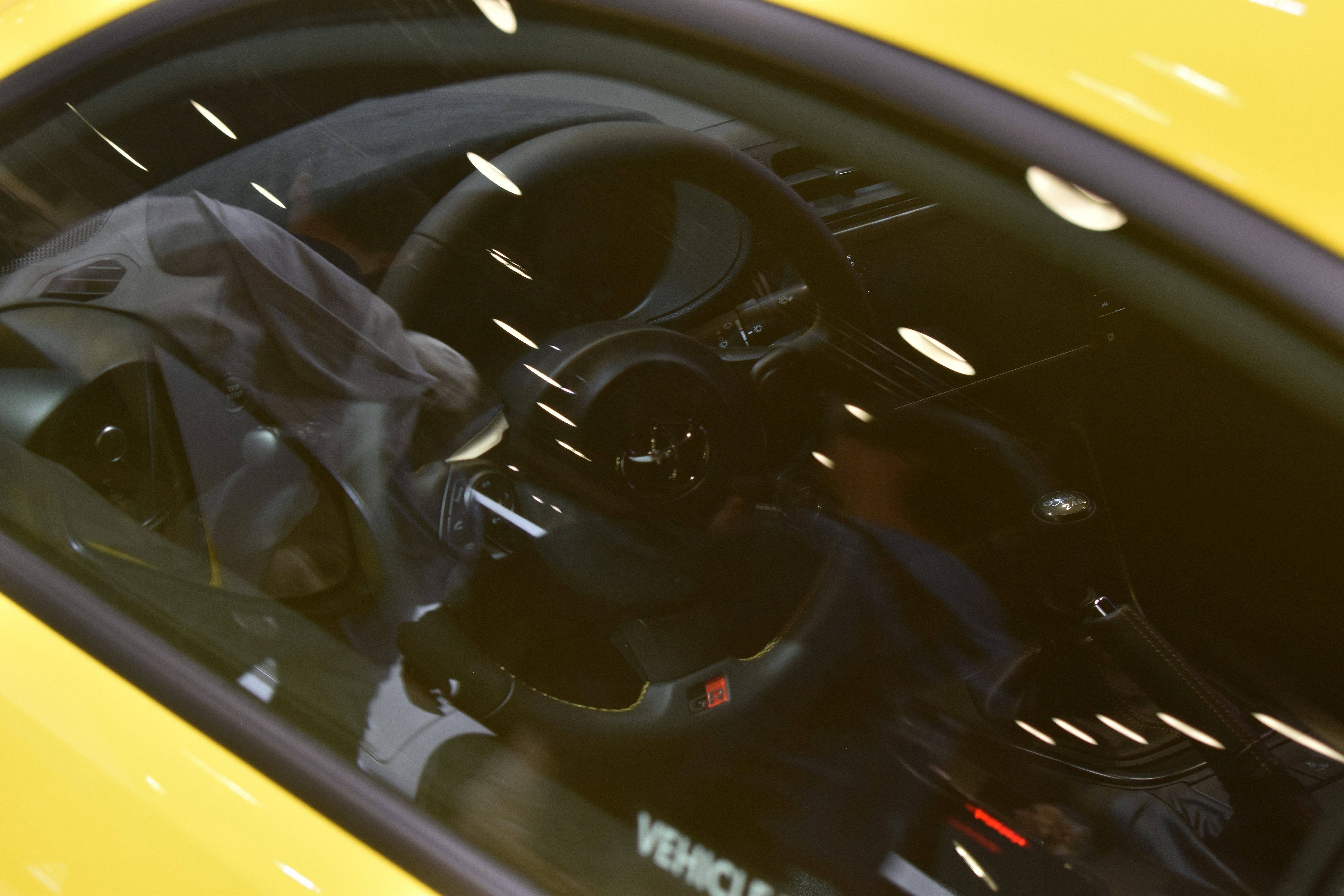 Yellow Car Shell, Hidden Steering Wheel and Shadows