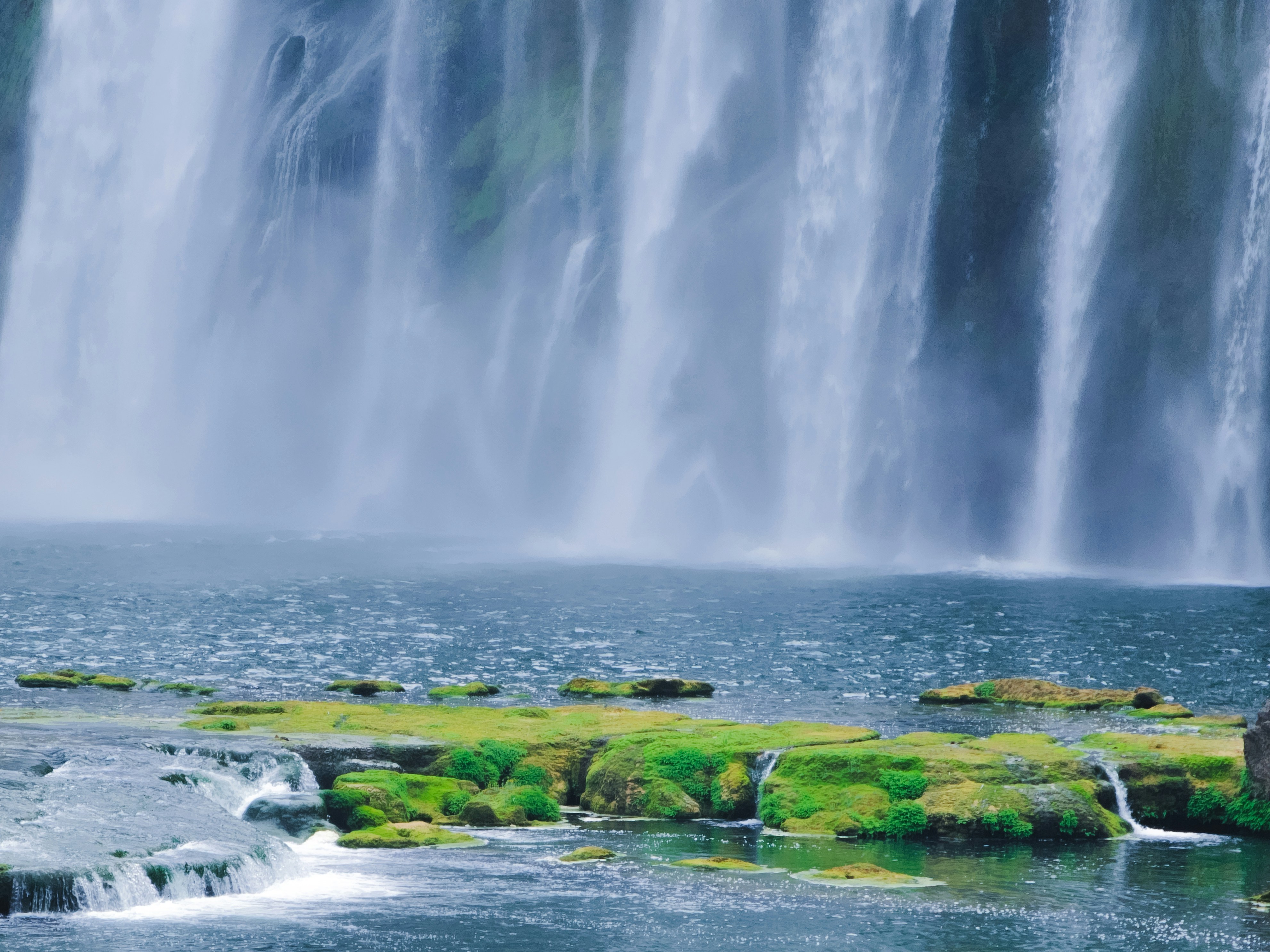 Misty Cascade at Ribbon Falls: mossy ledges meeting thunderous plumes