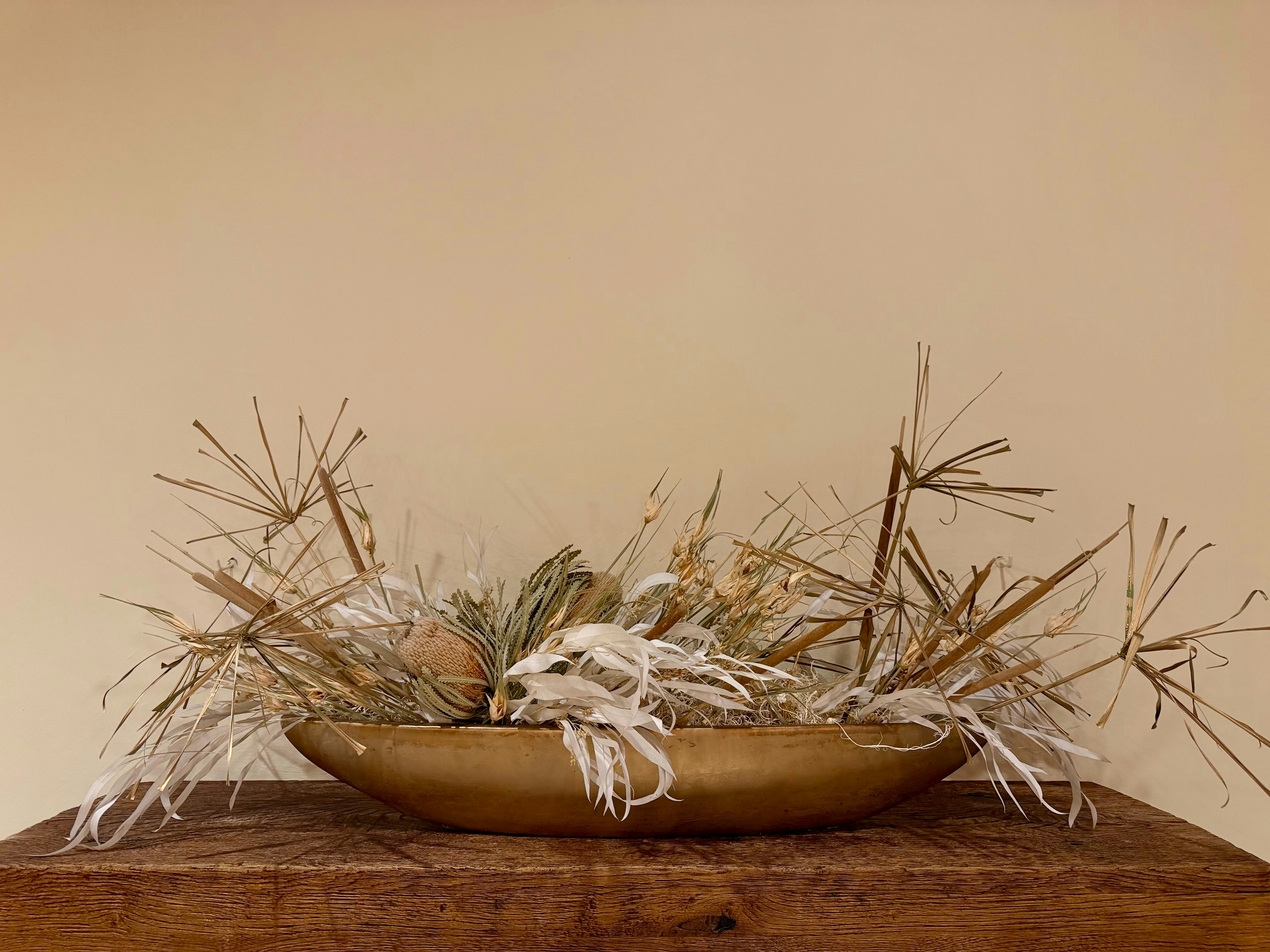 Deserted Floral Vessel resting on Weathered Wood