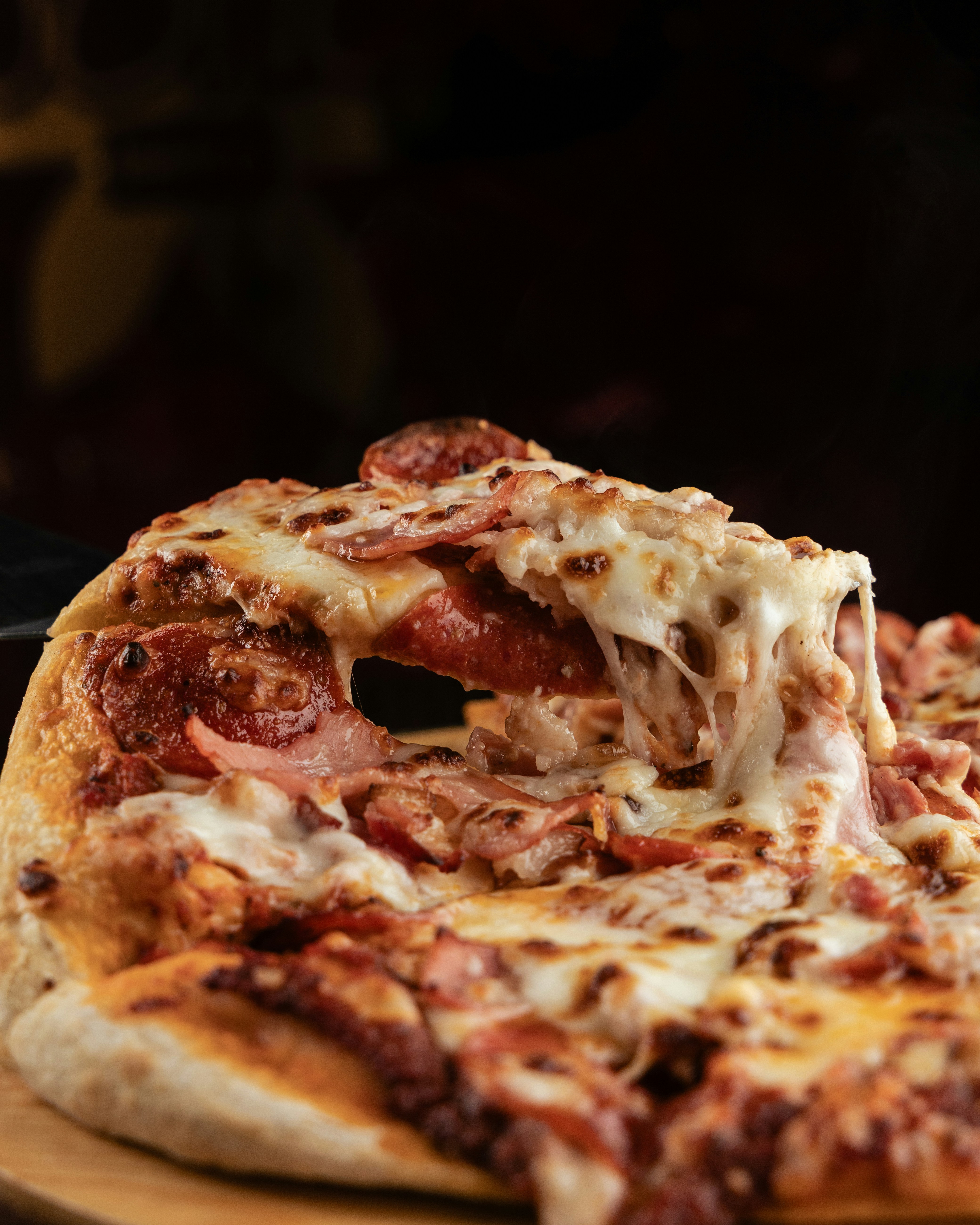 Melted Mozzarella Peak: A Cheesy Slice of Night Pizza