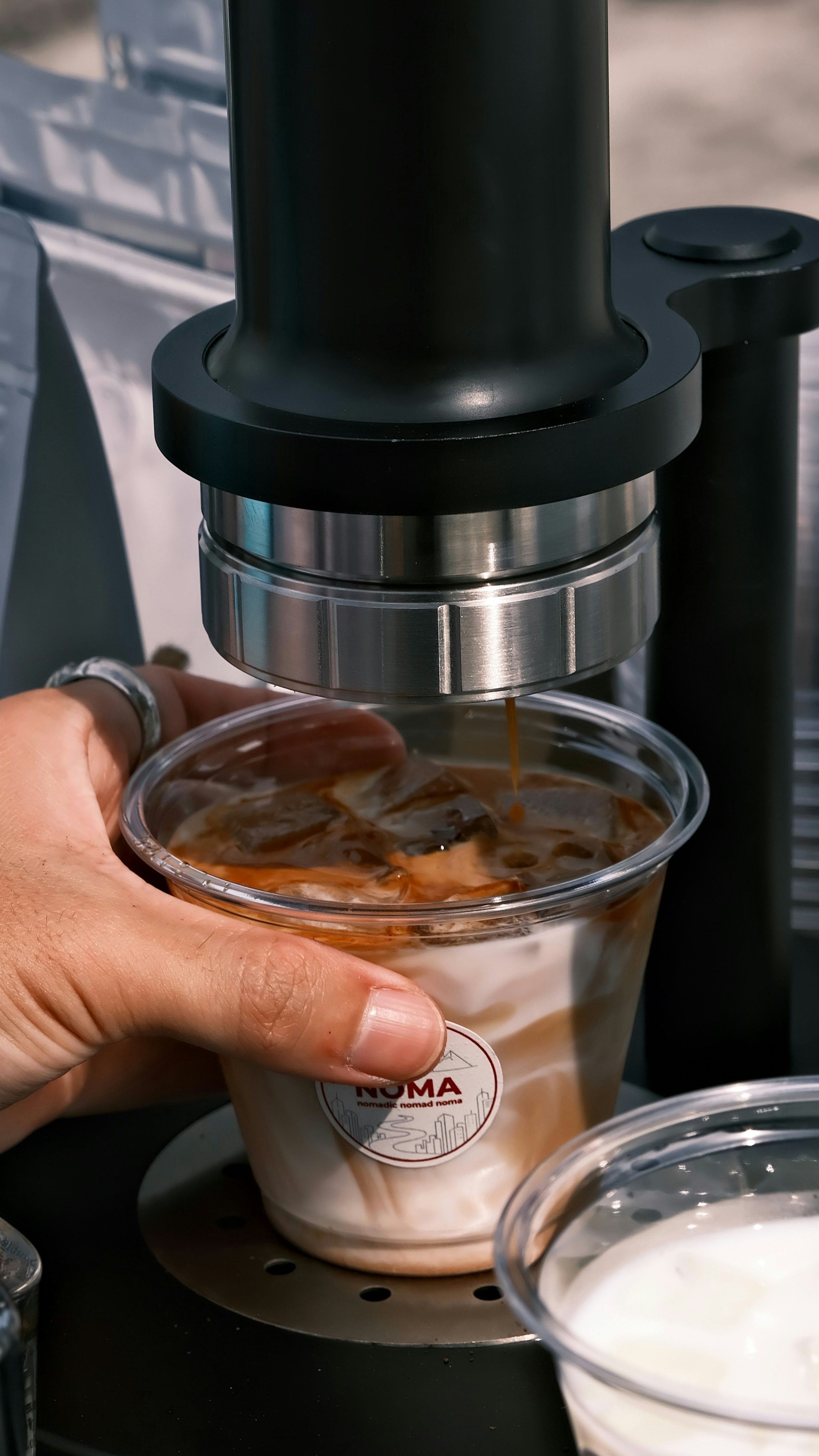 Cold Brew at Center Stage: A Barista’s Handcraft Moment Under Industrial Rigging