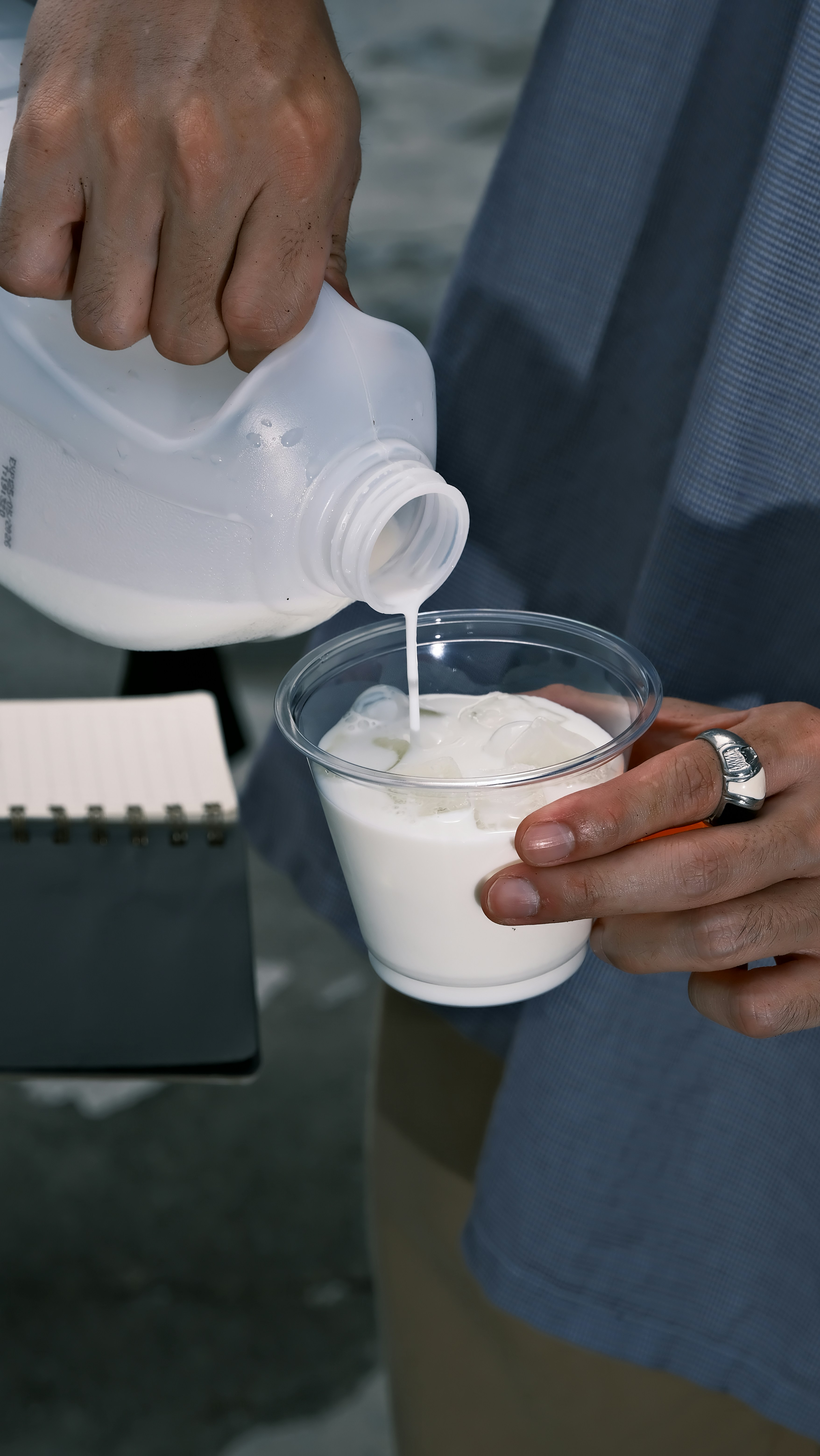 Milk Pour: A Moment of Quiet Texture in a Handheld Beverage Pour