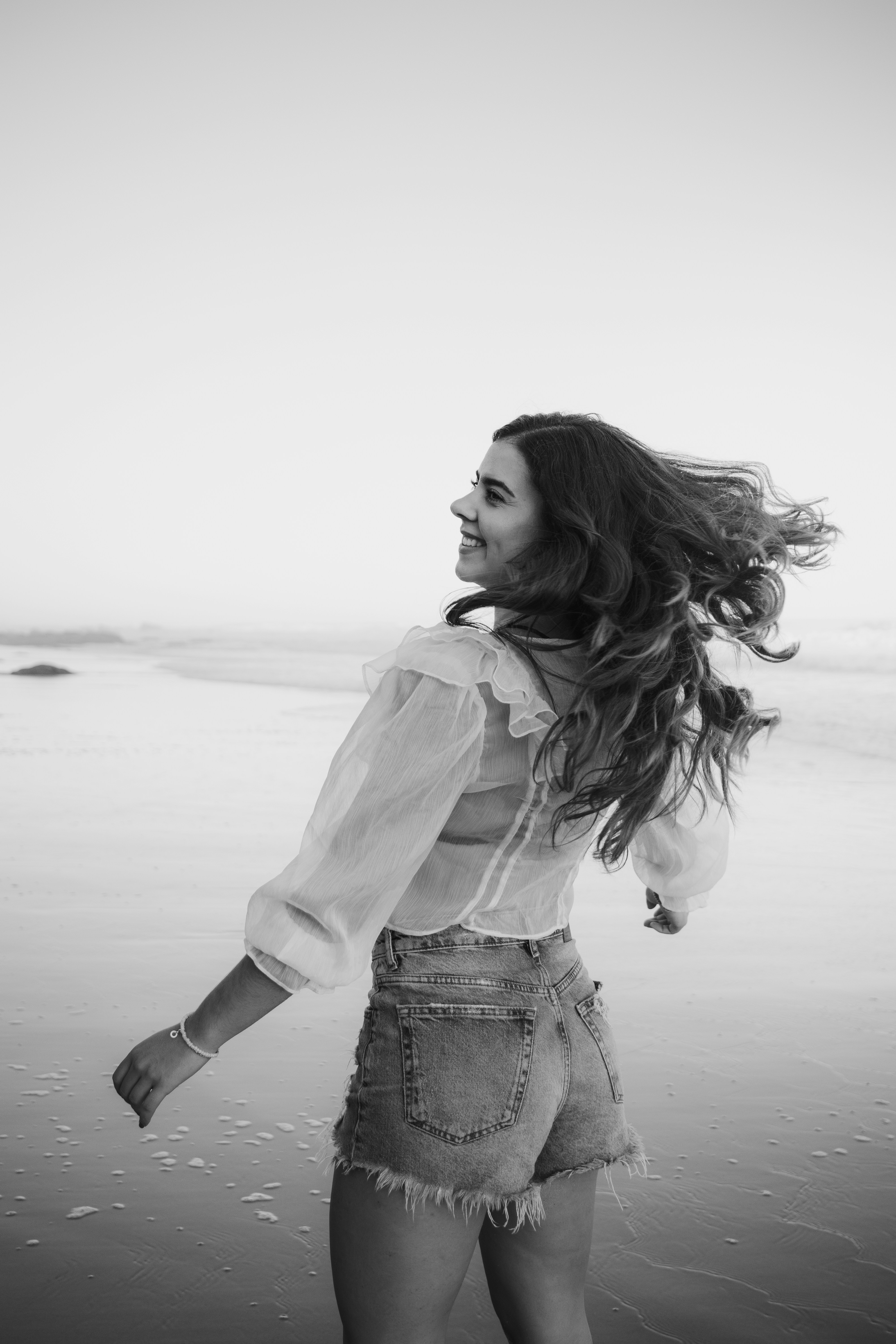 Joyful Wind: A Beachside Spin with Sunny Grin