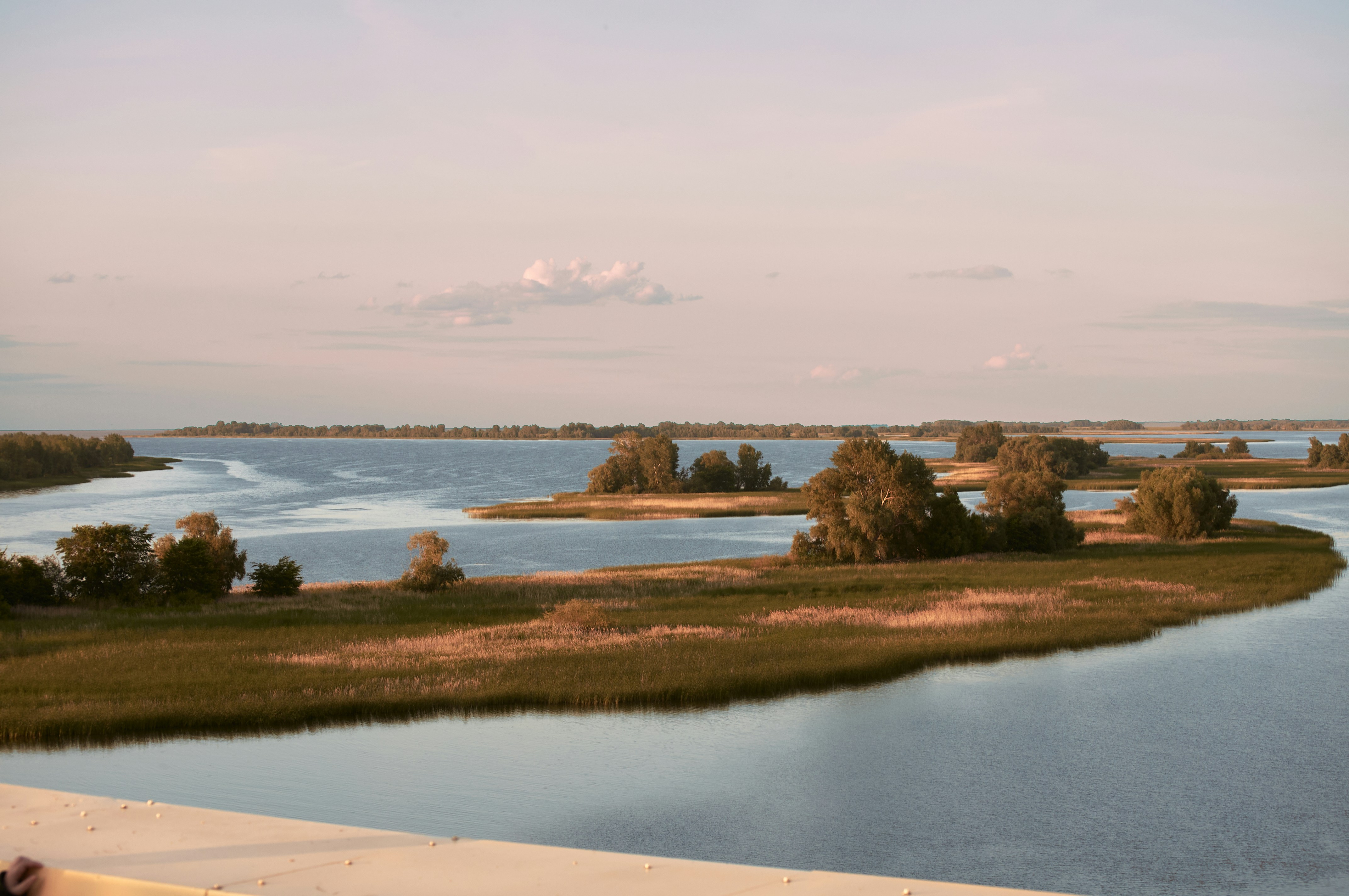 Calm Delta: A Sunset Over Meandering Wetlands