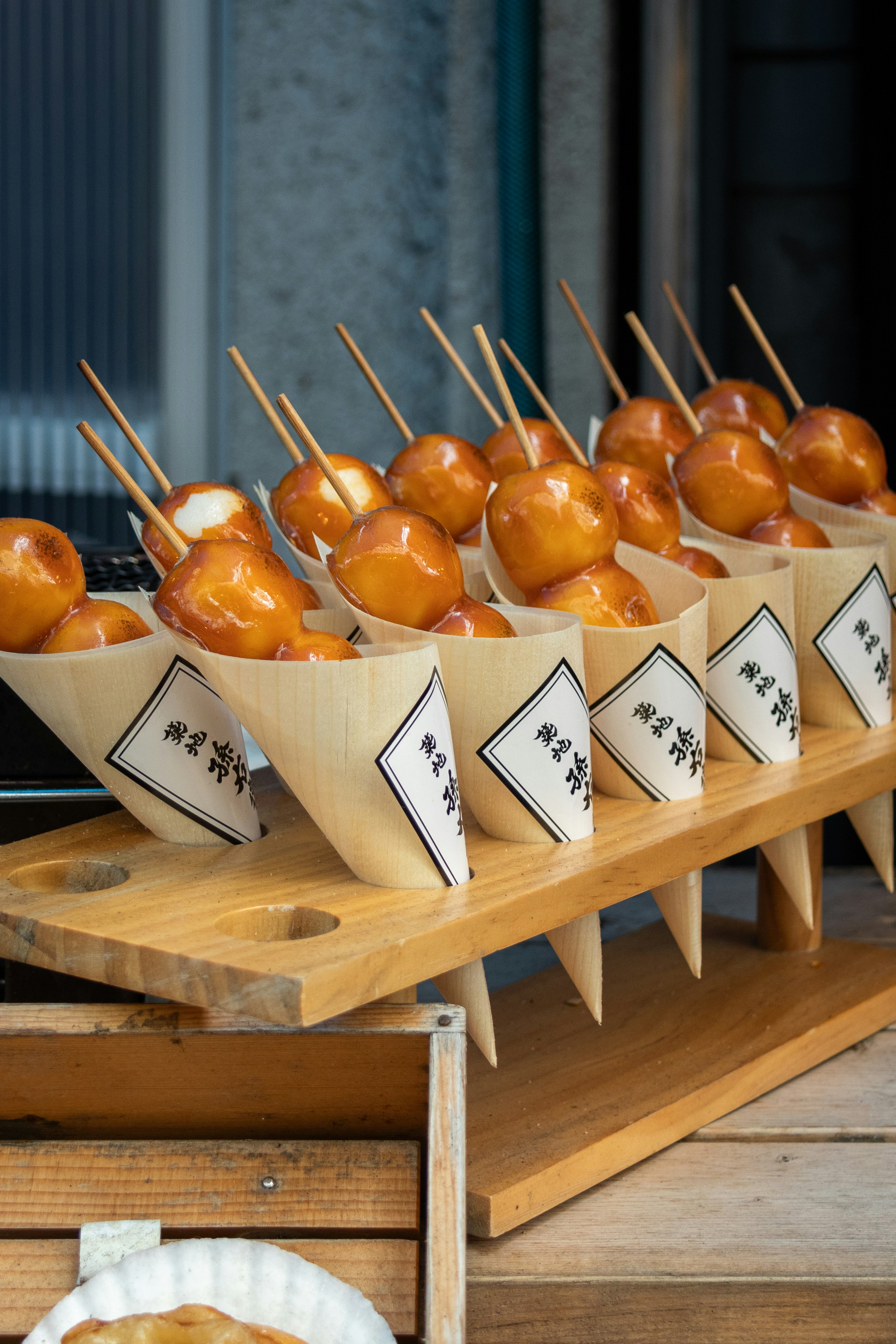 Caramel-glazed Dango Skewers Lineup in Wooden Stand