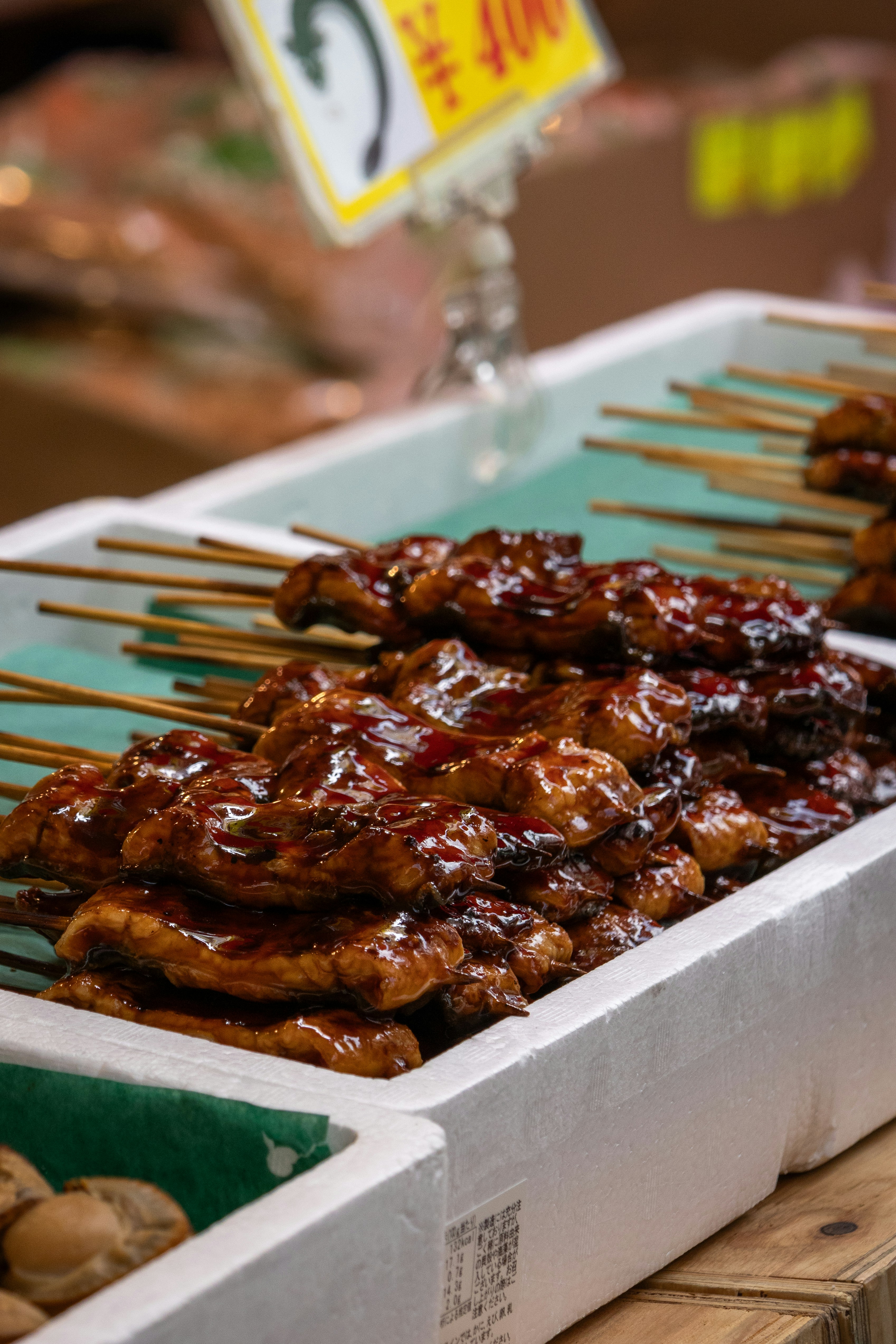 Sticky Skewers on Ice: Street Market Grilling Under Neon Signs
