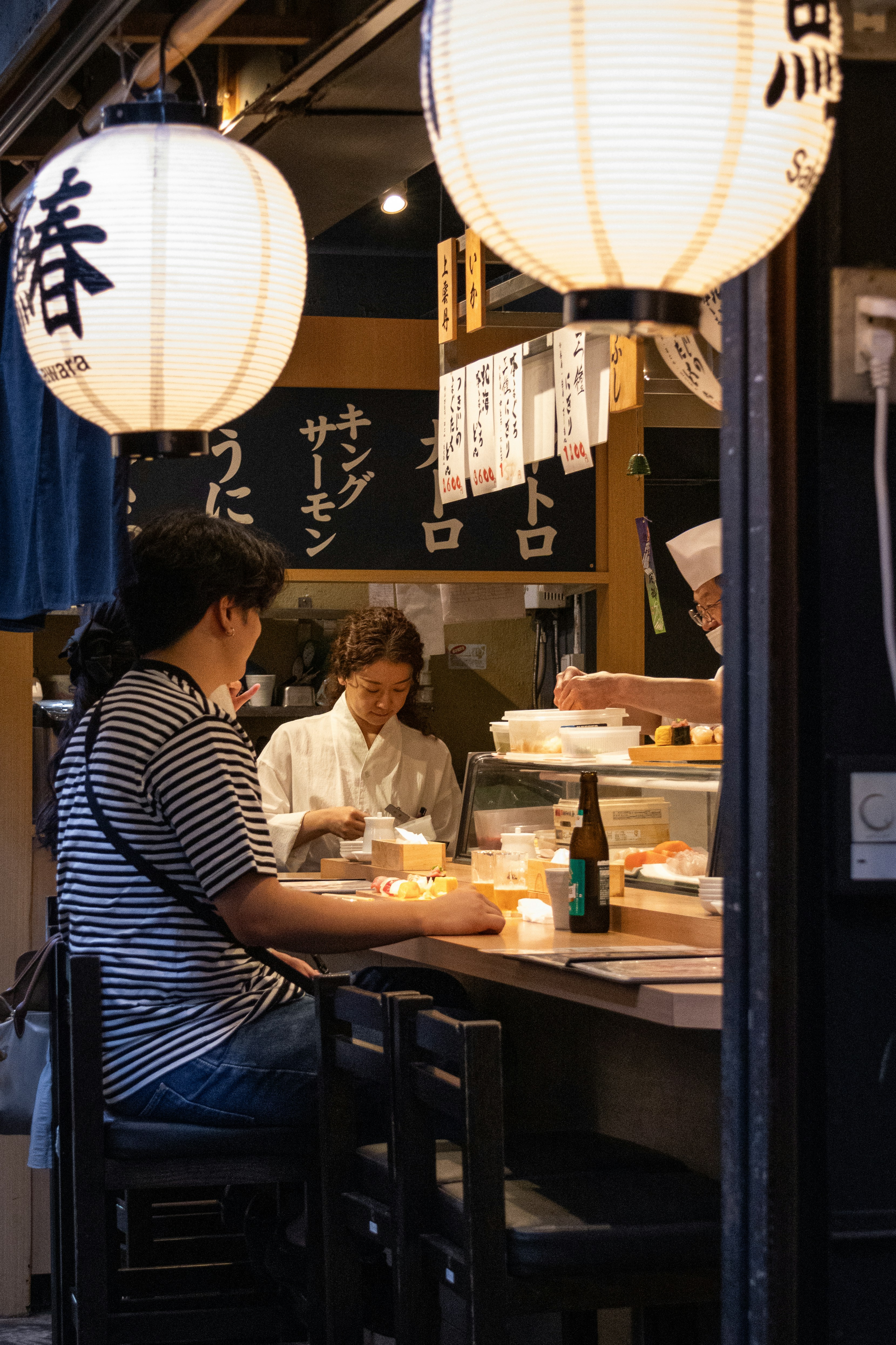 Midnight Izakaya: Lanterns Hover Over a Quiet Sushi Bar