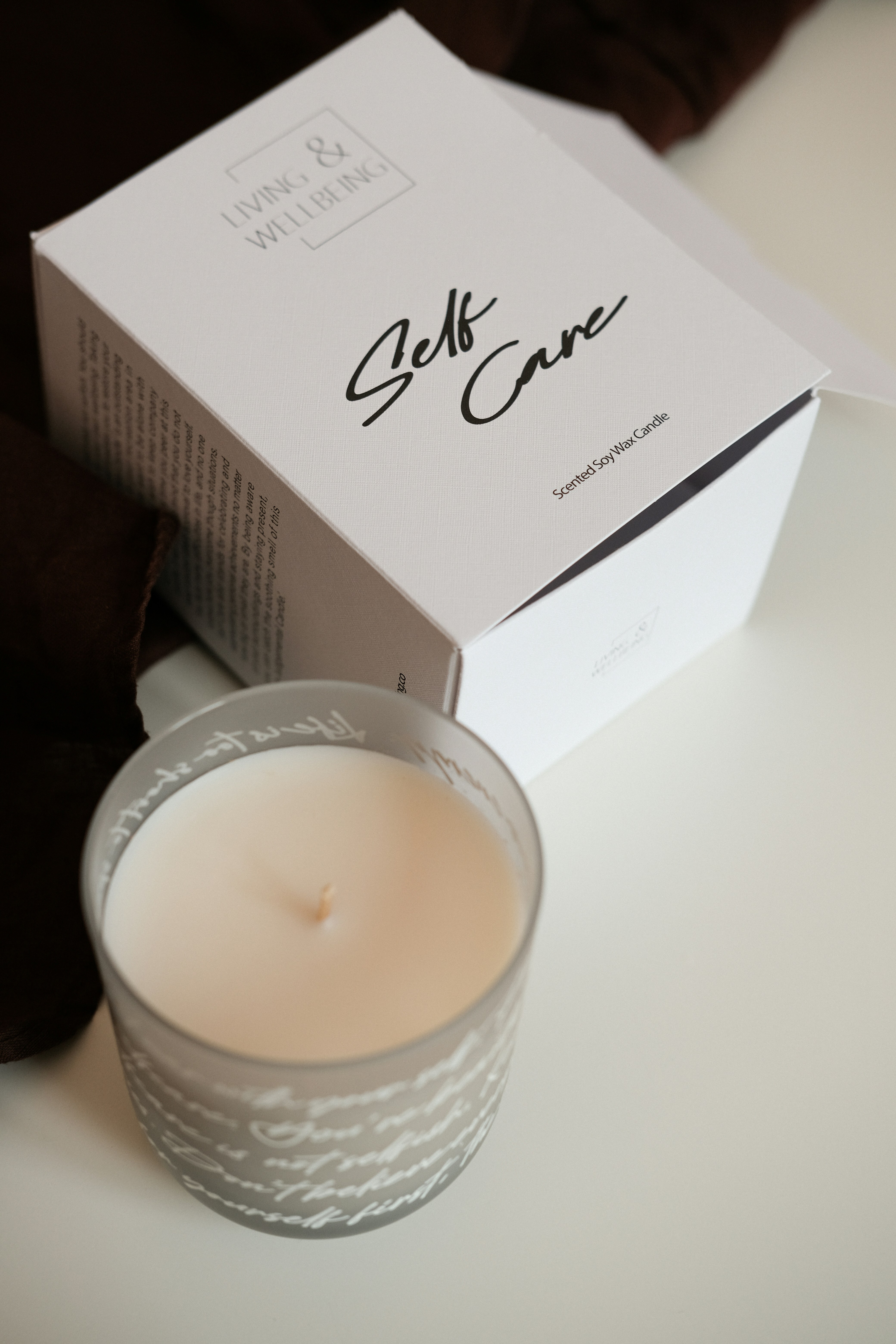 Soft Glow and Silhouette: Scented Serenity in a Minimal Still Life