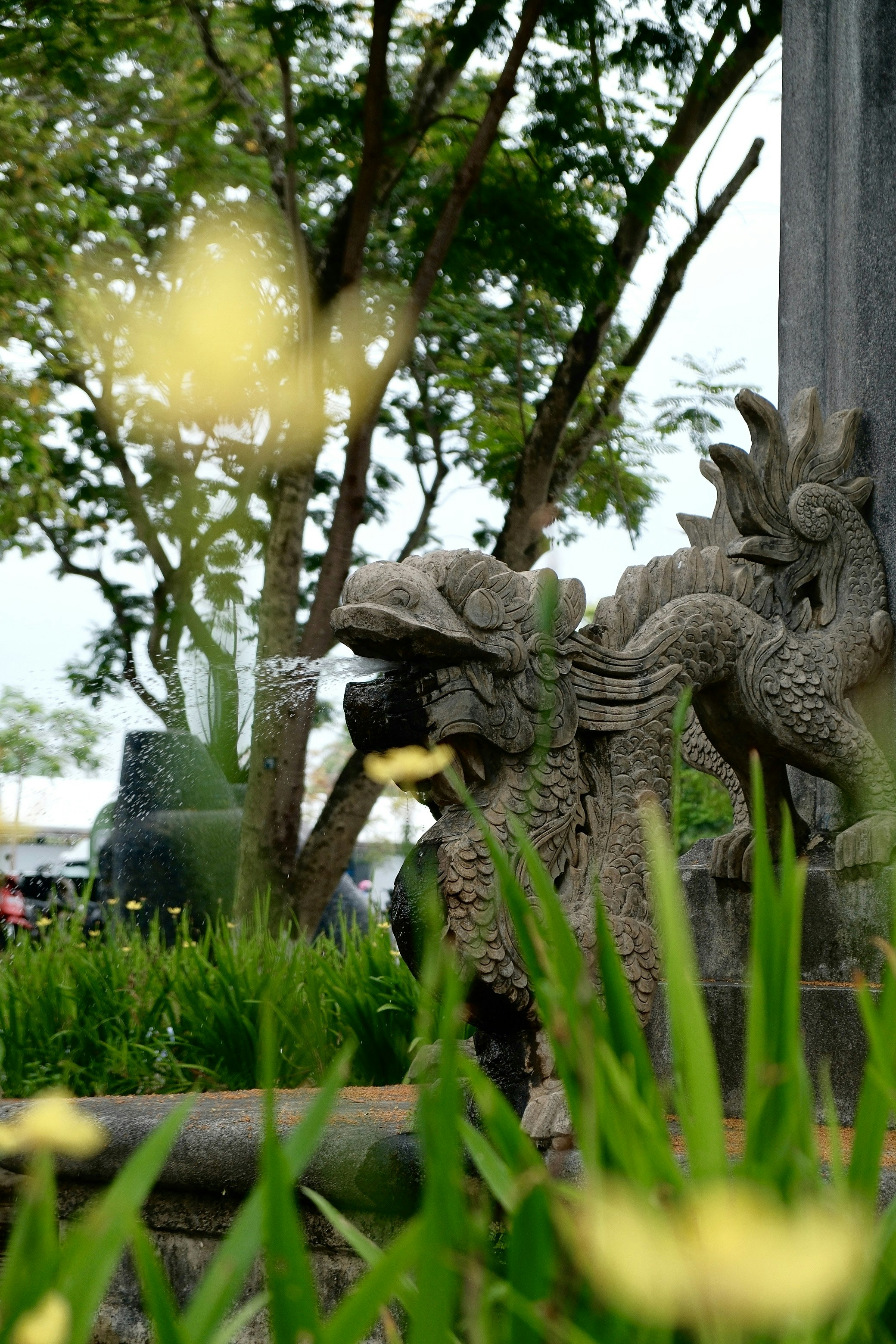 Dragon statue garden in soft focus foreground