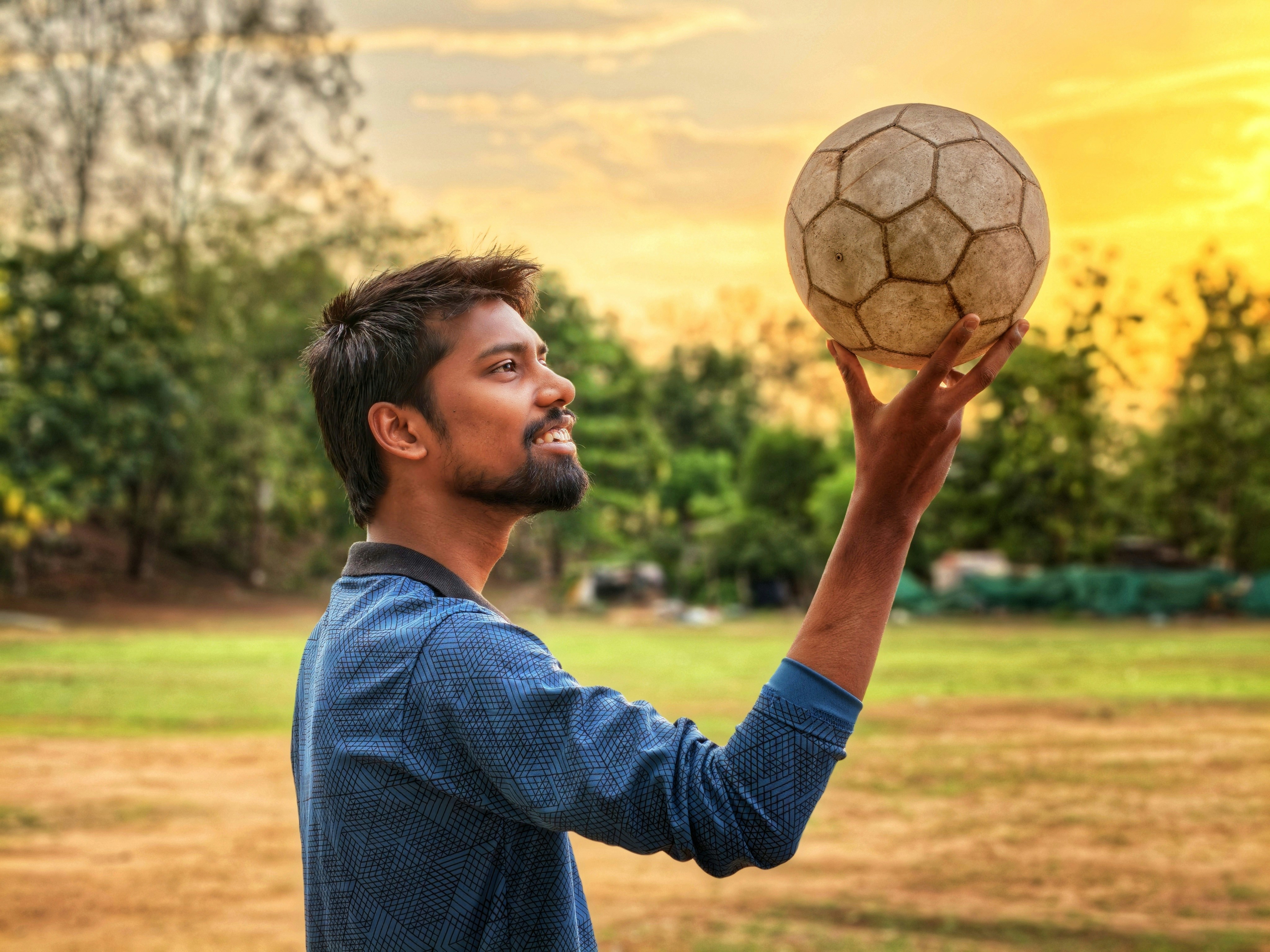 Spinning Hope: A Player’s Graceful Reach at Sunset