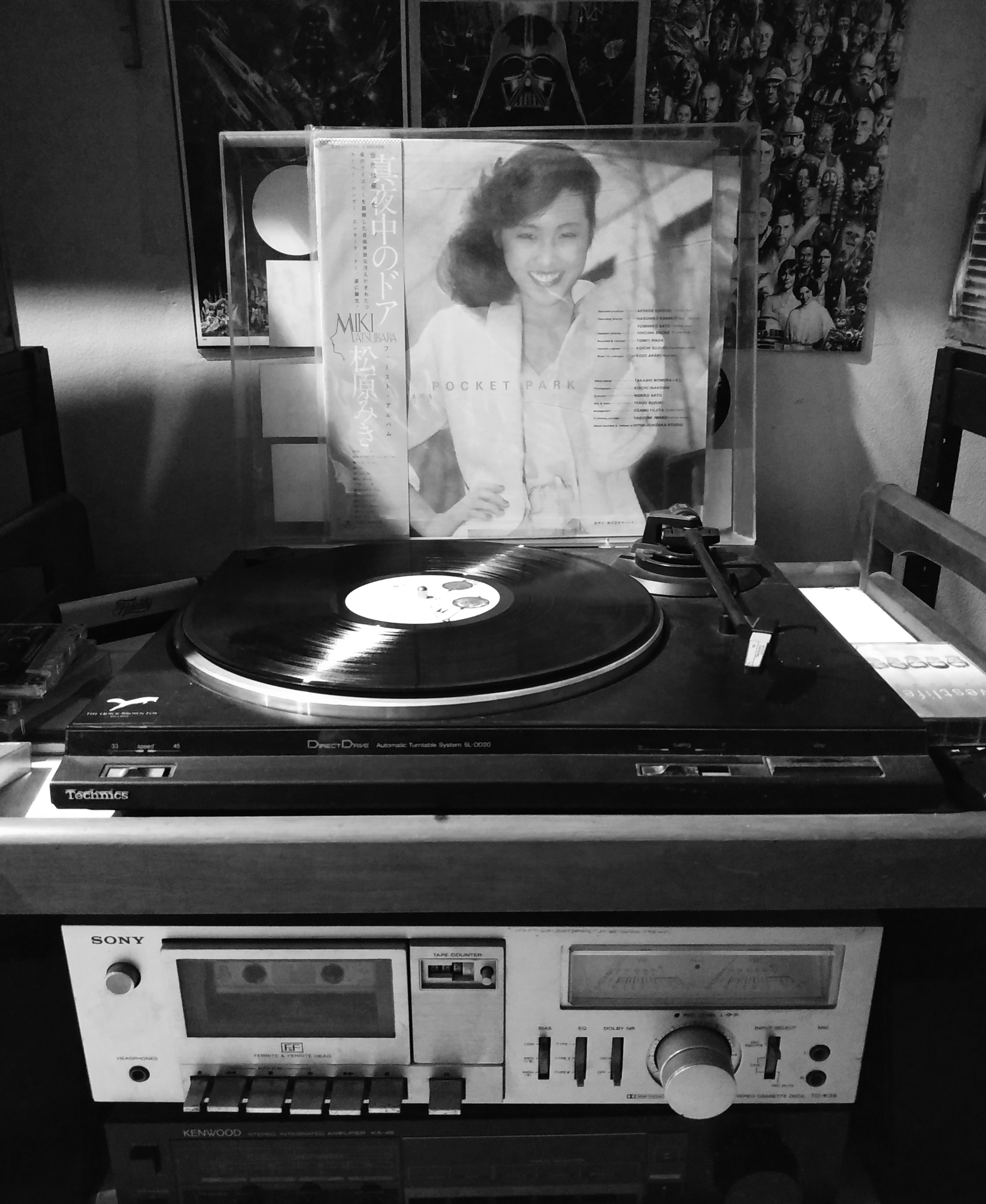 Vinyl Echoes: A Turntable Portrait in a Mondrian Night