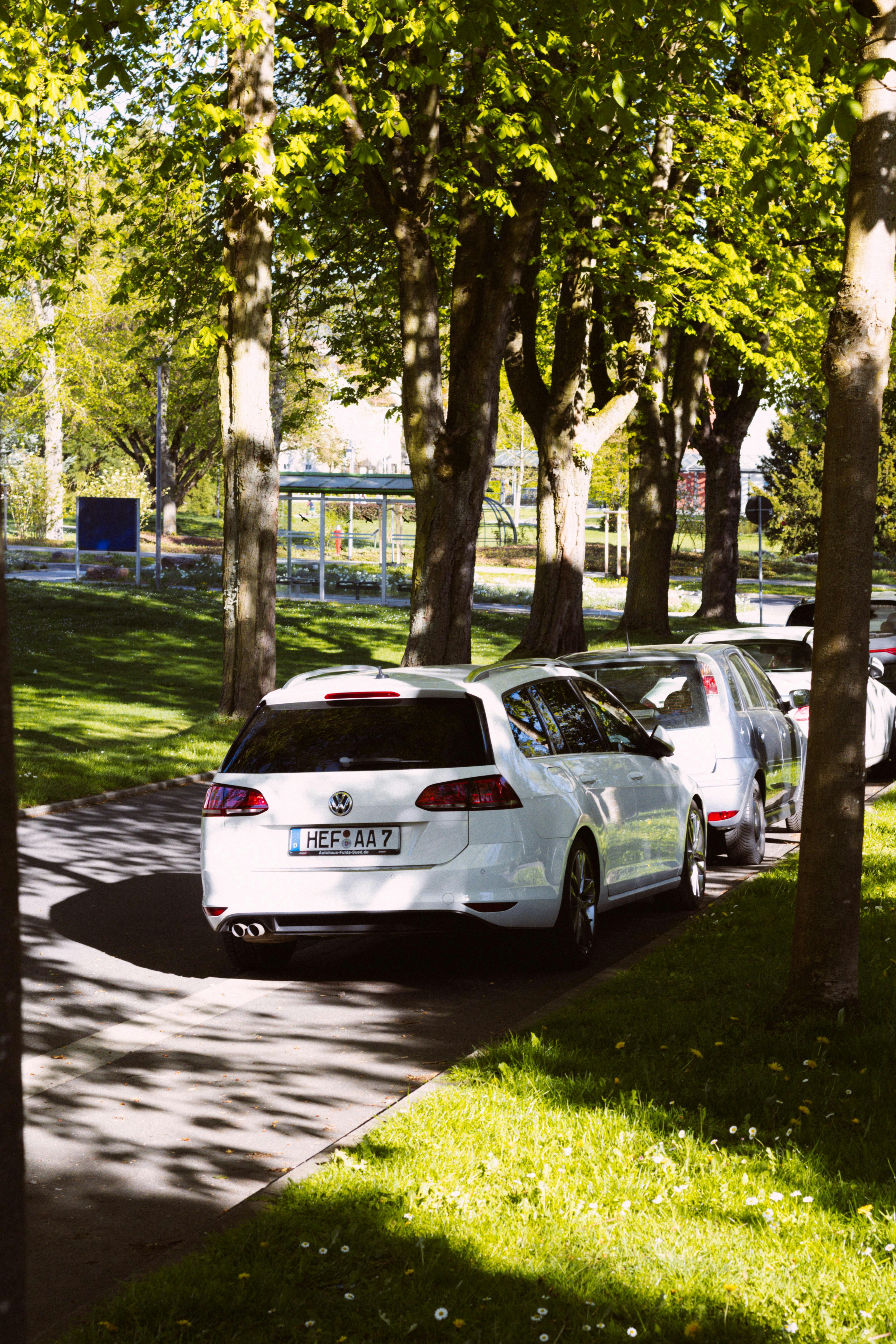 White Station Wagon in Shade of City Row