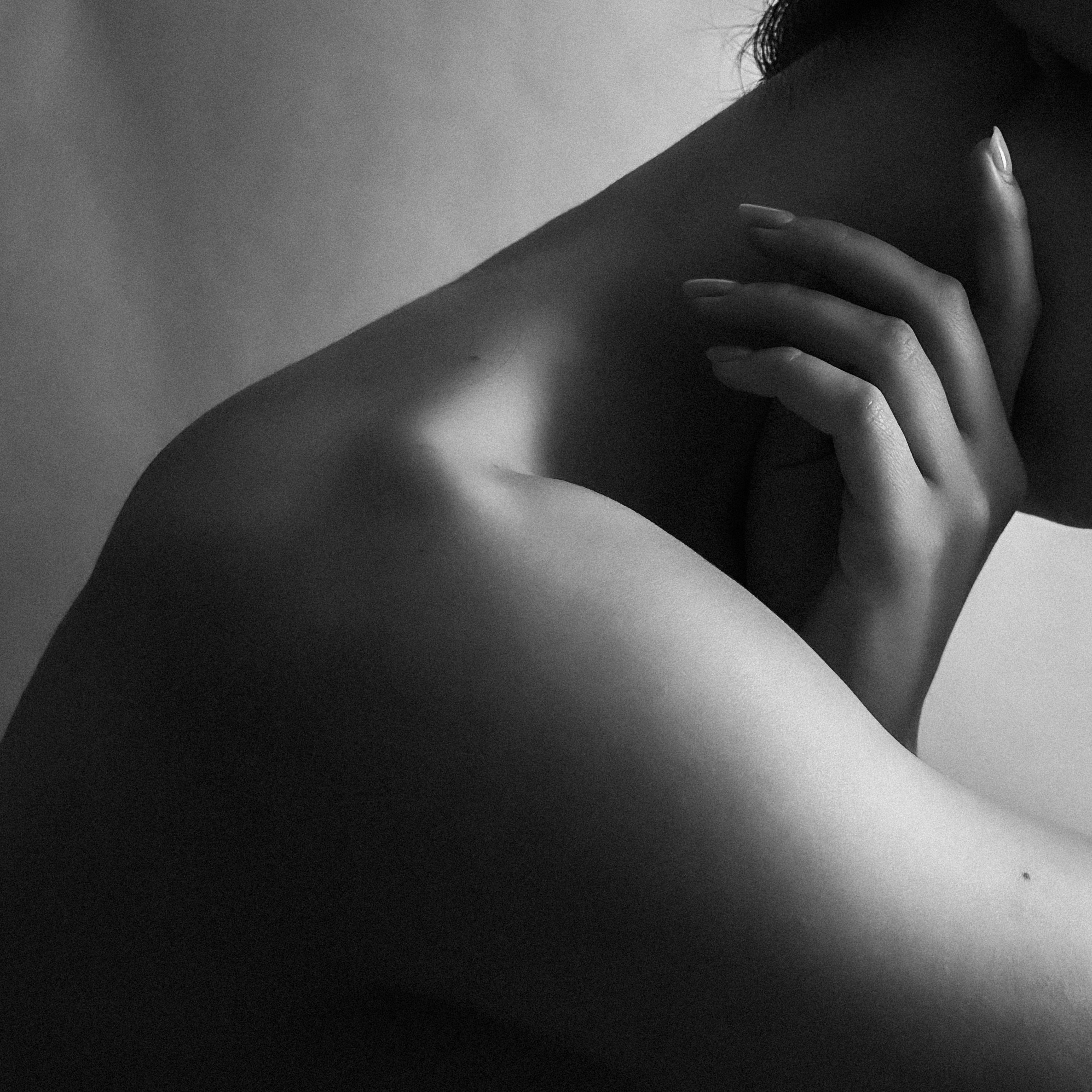 Close-Up Contours: A Quiet Moment on Bare Skin