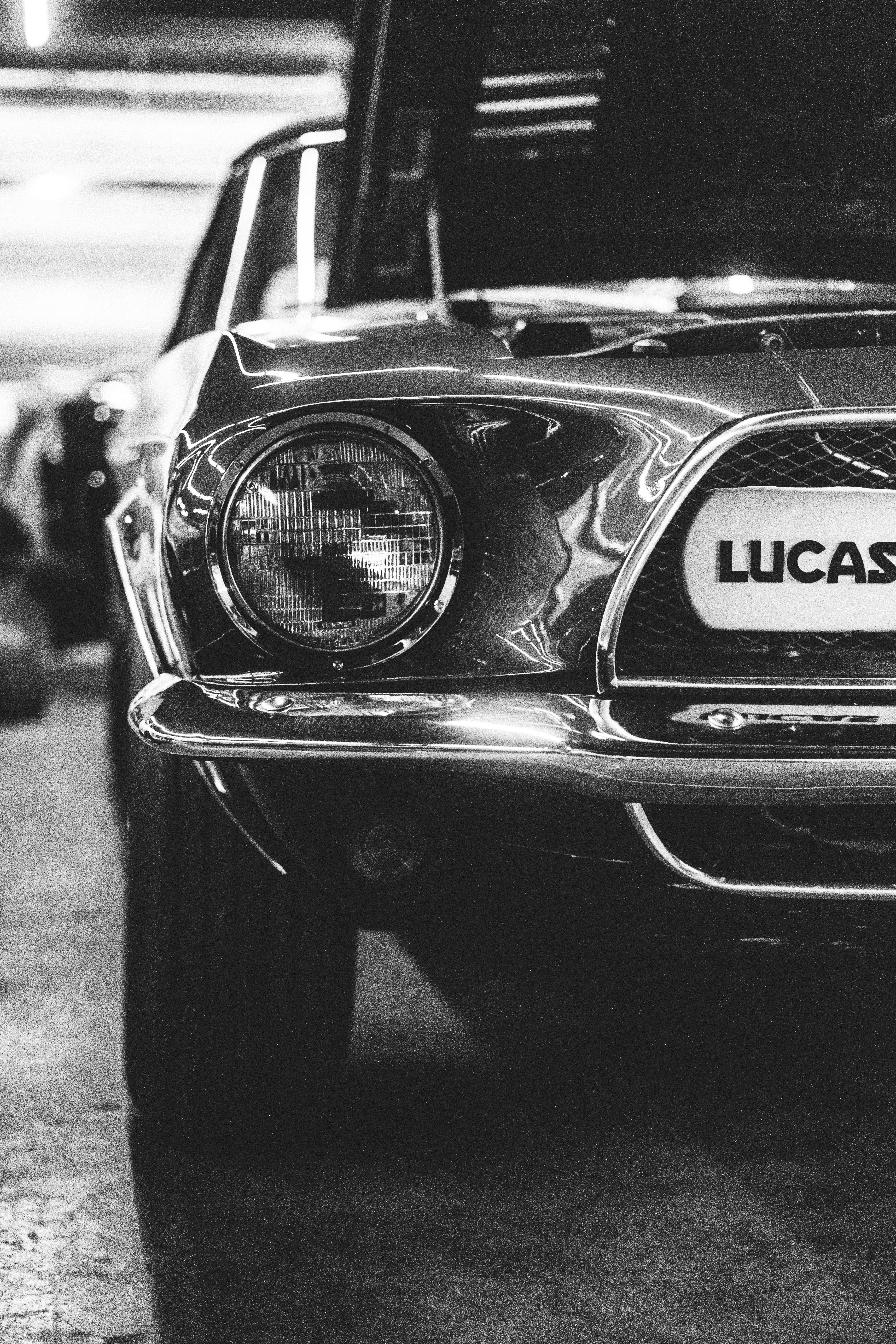 Chrome and Shadows: The Front Quarter of a Classic Lucas Rally Car