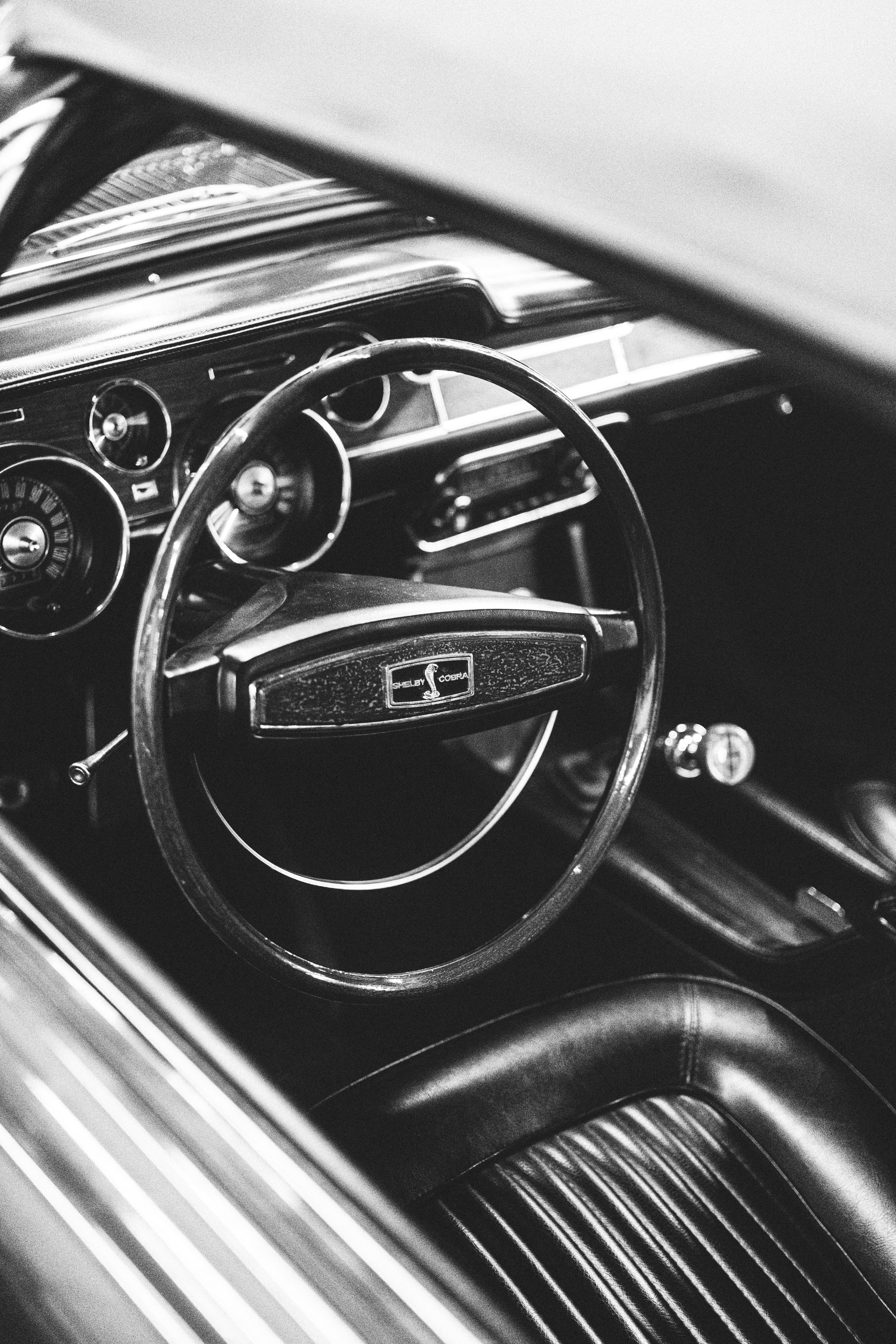 Tilted Classic: The Central Steering Wheel of a Vintage Car