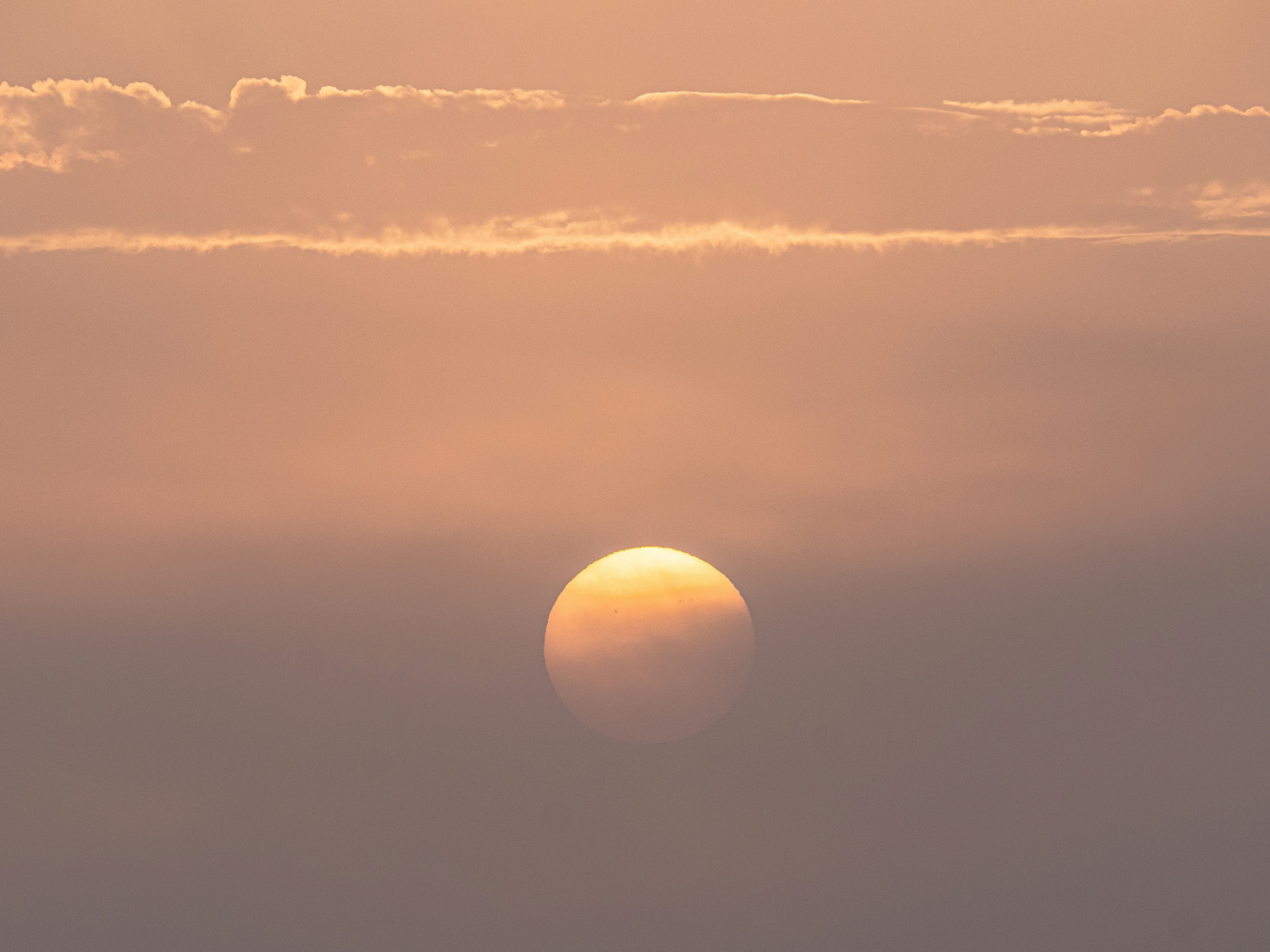 Solar Sphere on a Peach Mist Horizon