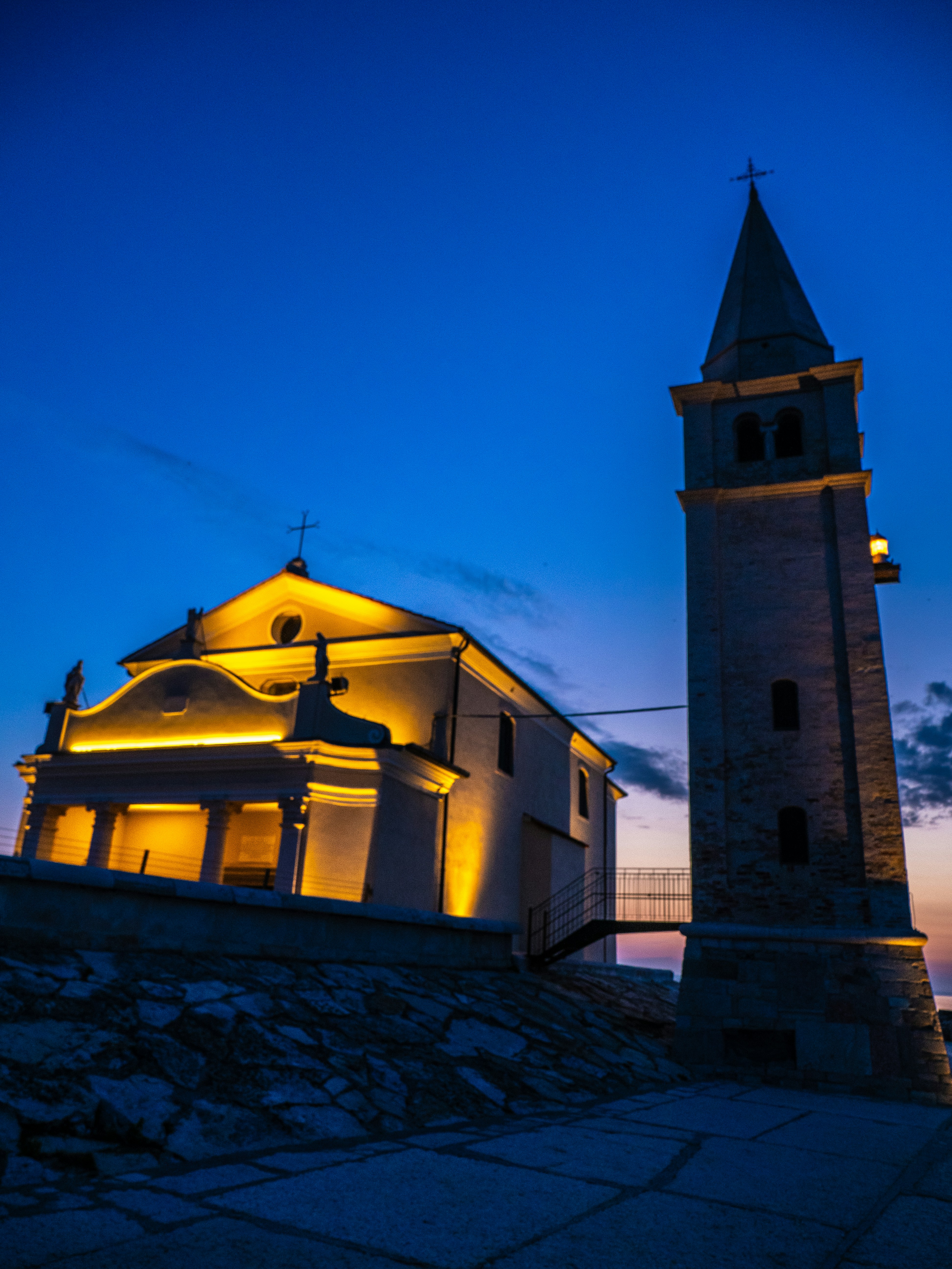 Golden Illumination Over a Quiet Coastal Chapel