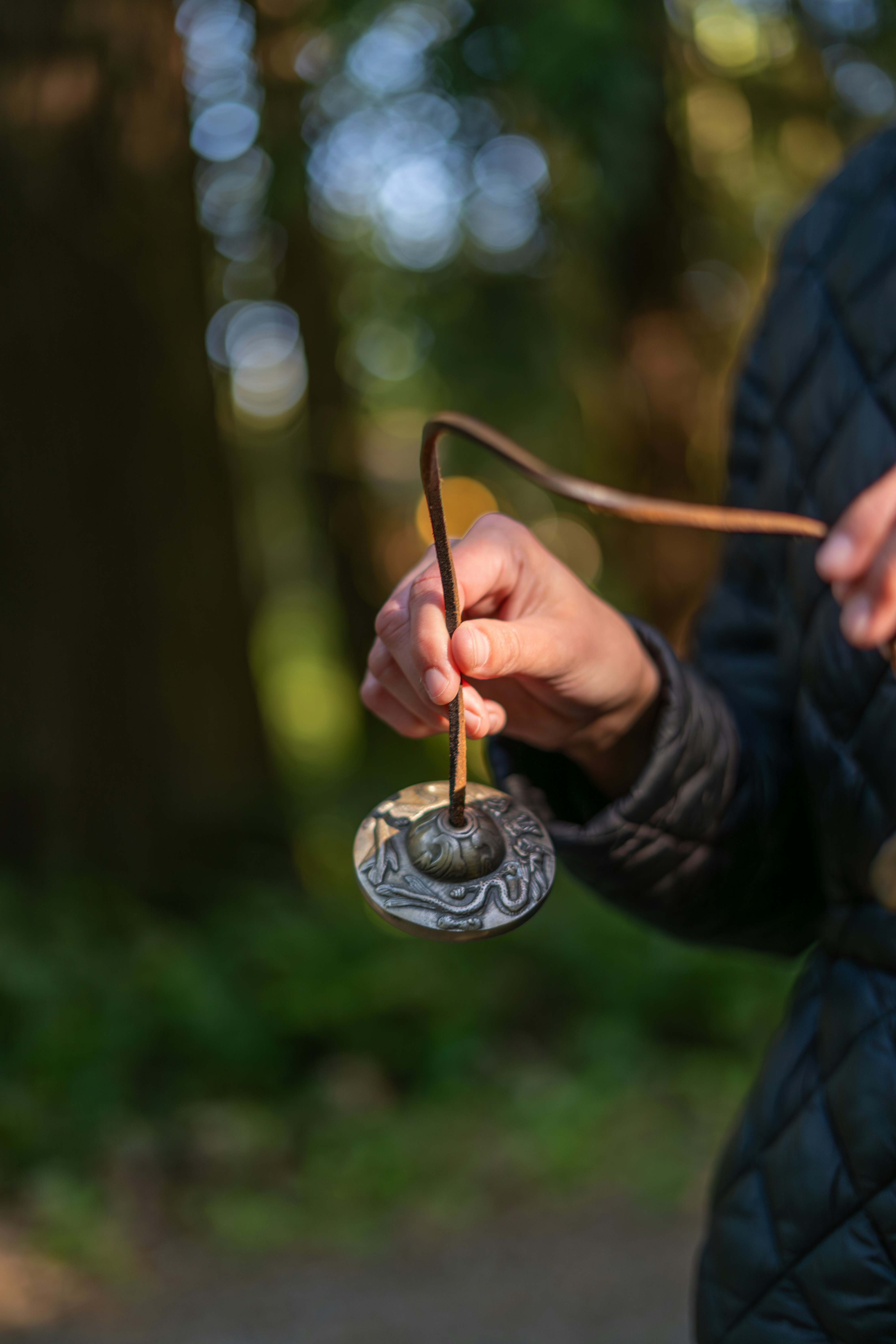 Pendant Lift: A Dark-Backlit Keepsake in a Forest Glade