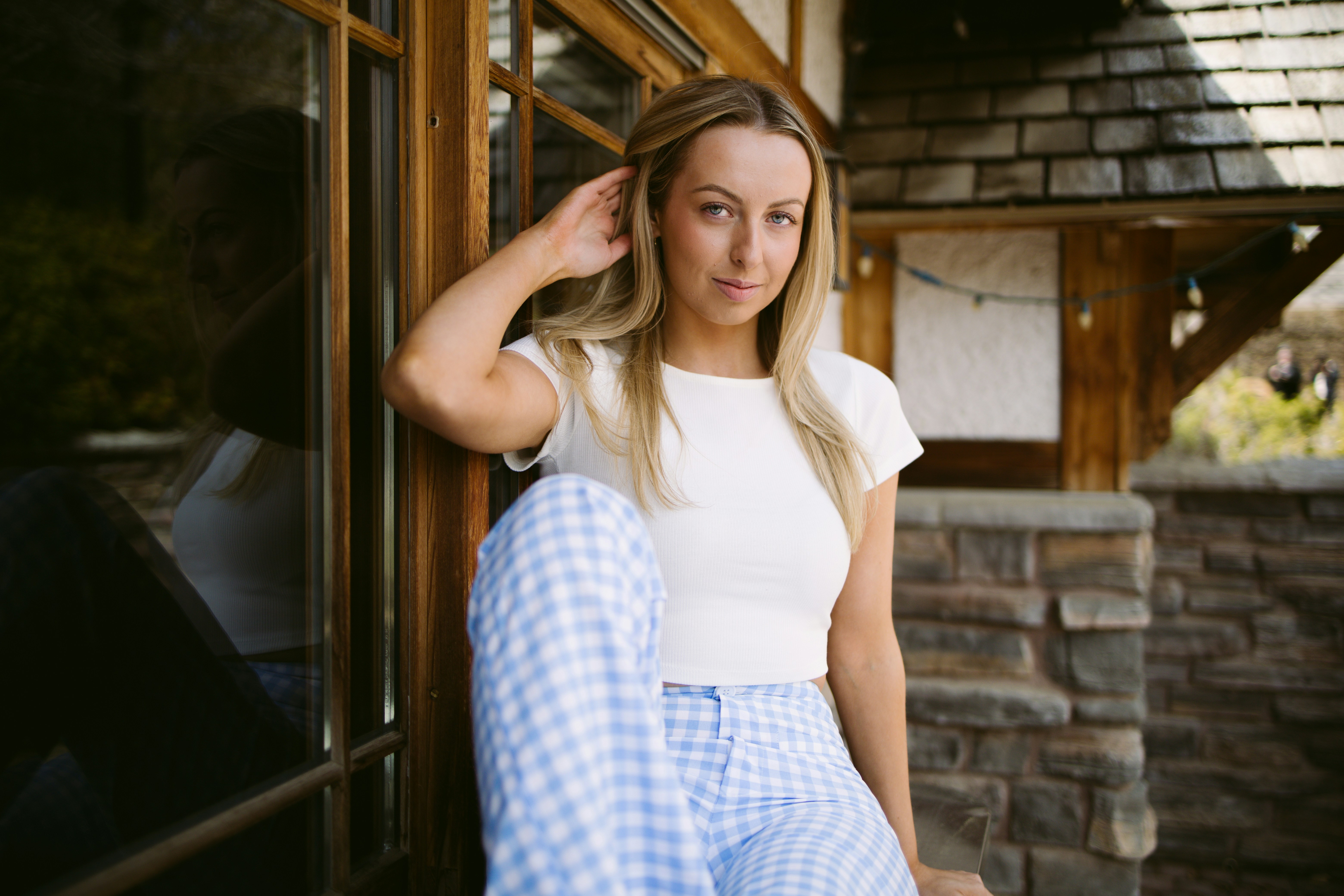 Quiet Confidence on a Wooden Veranda