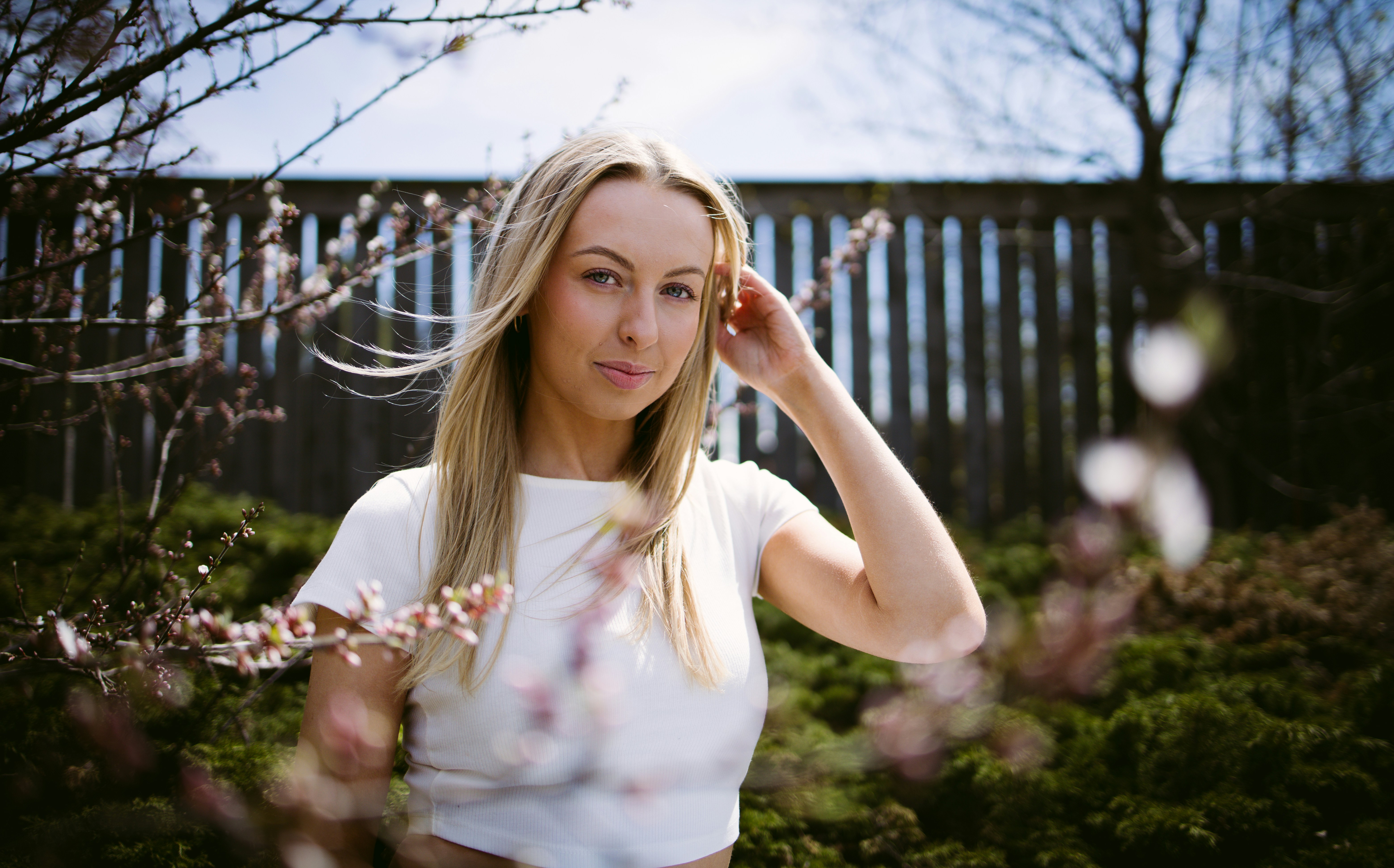 Sunlit Portrait in a Blossoming Garden