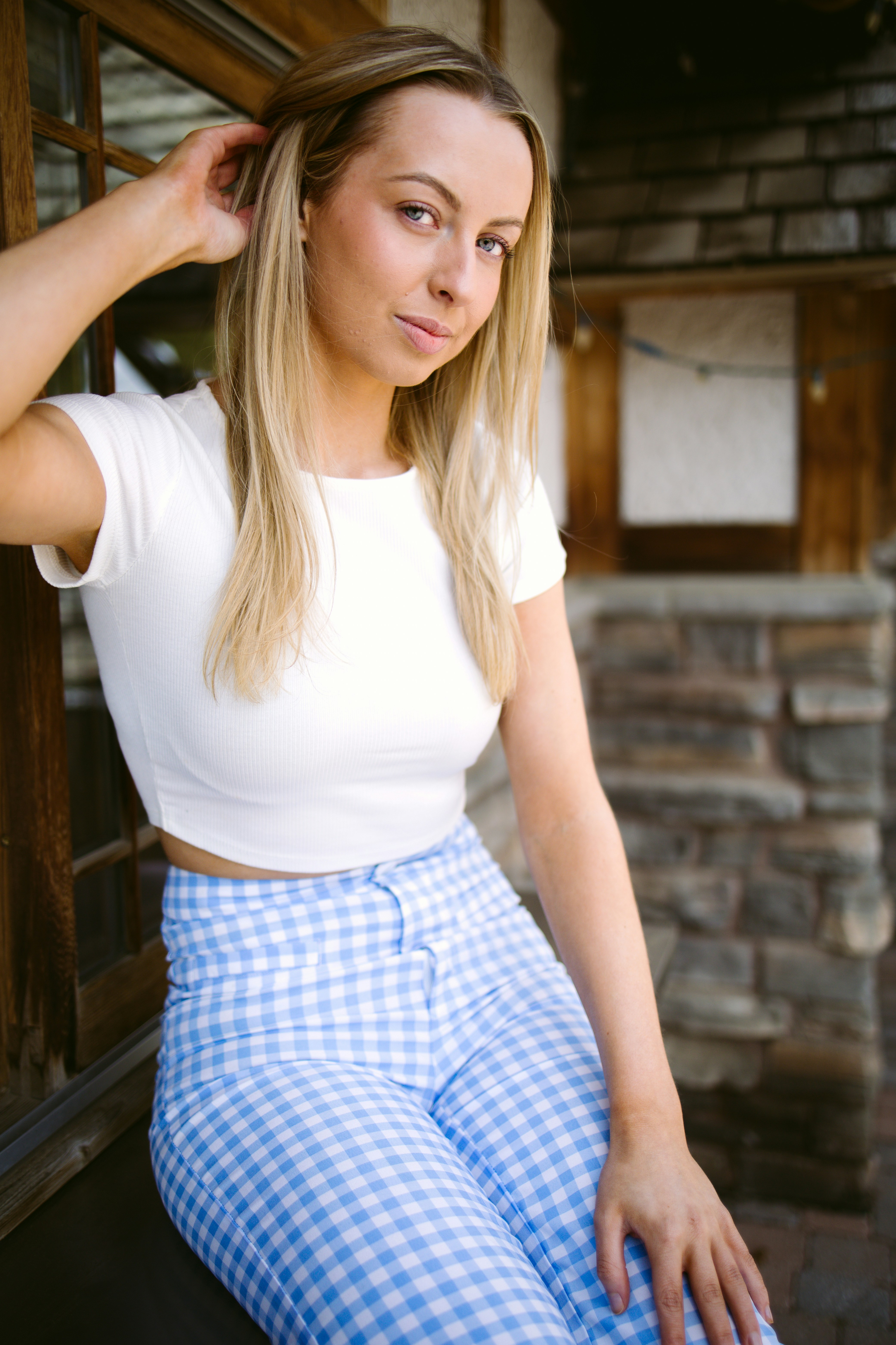 Portrait on a Wooden Veranda: Soft Light, Strong Presence