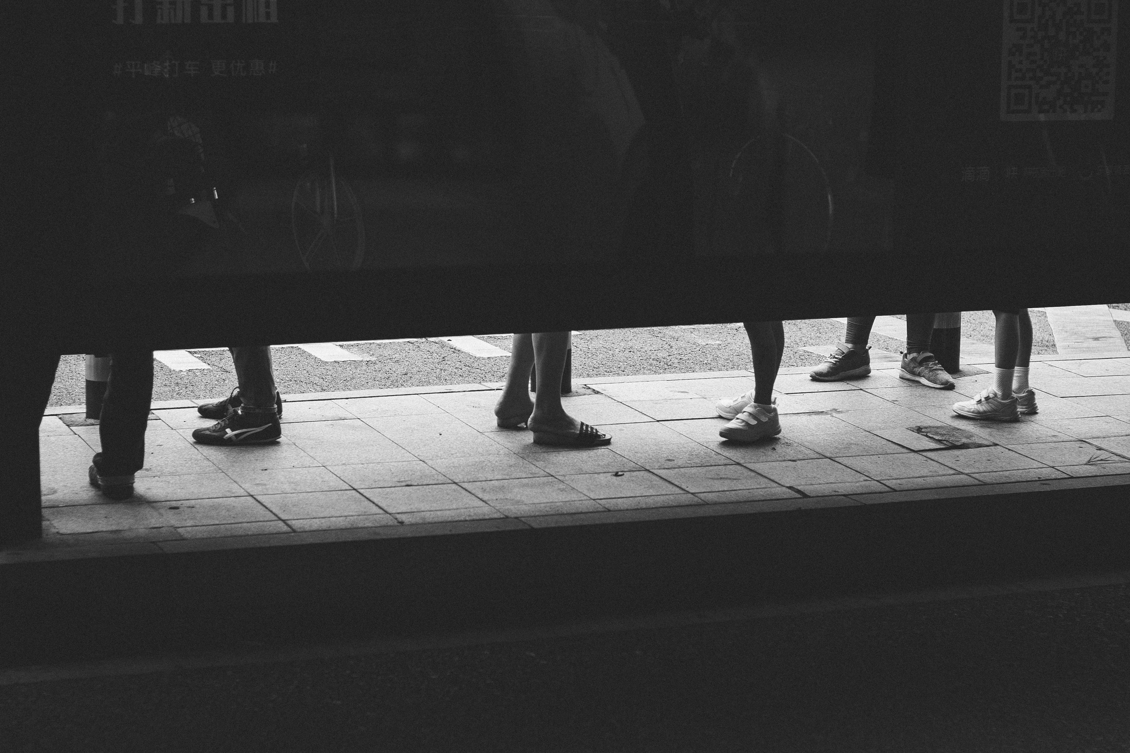 Shadows at the Platform: Feet and Footwear in Late-Shift Silence