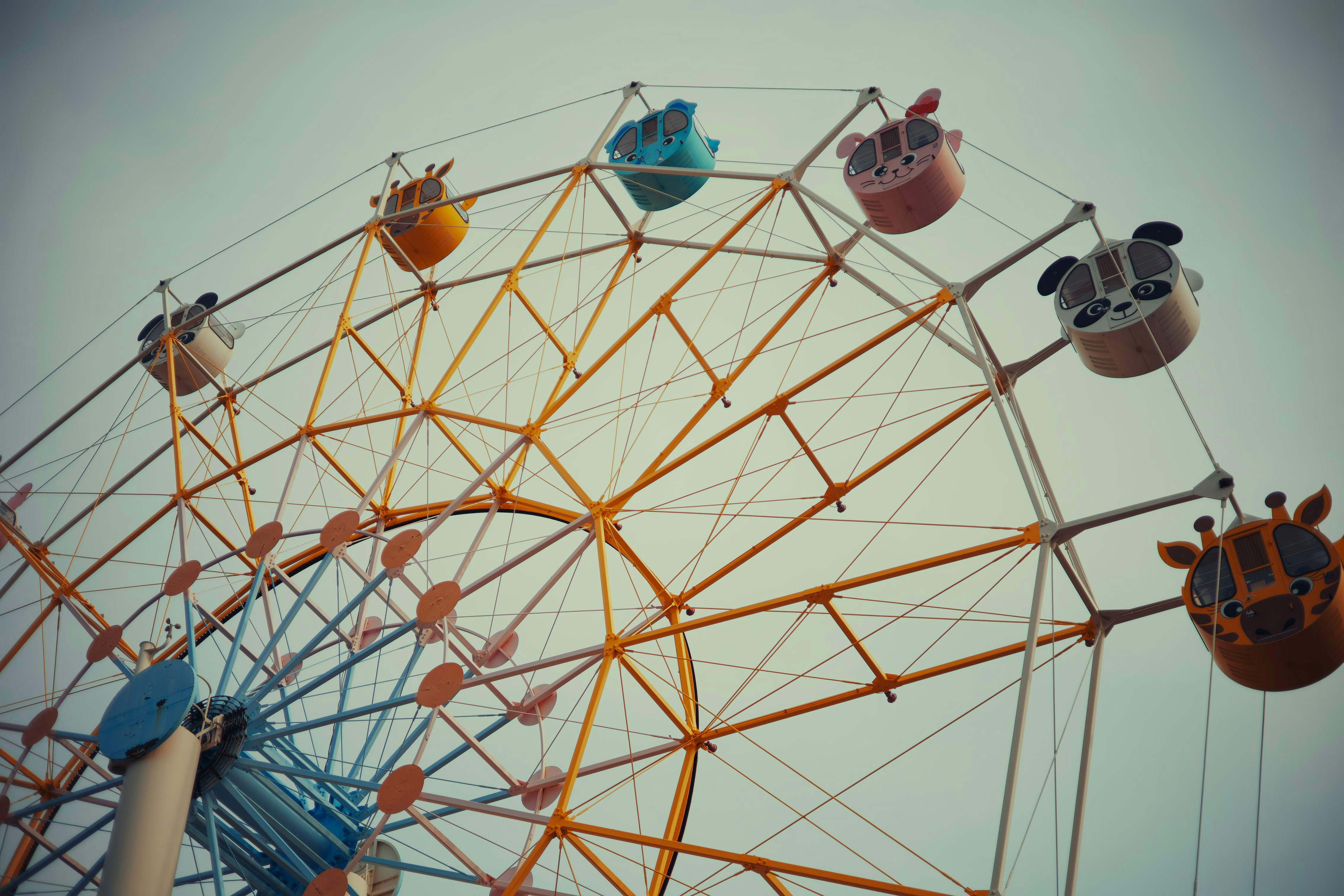 Glimmering Ferris Wheel Edges: A Sunset Tilt