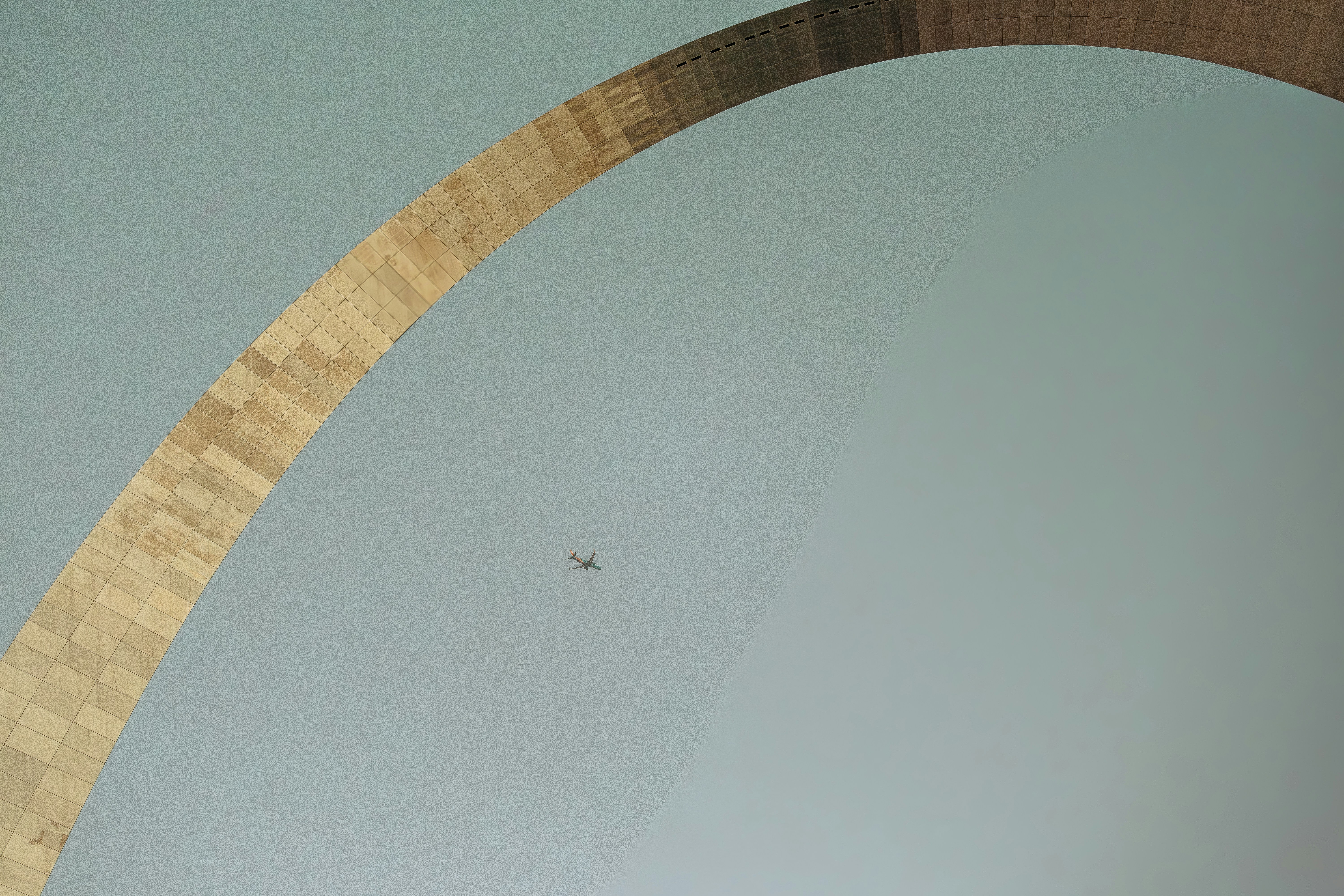 Arching Dawn: A Flight Above the Silent Arc