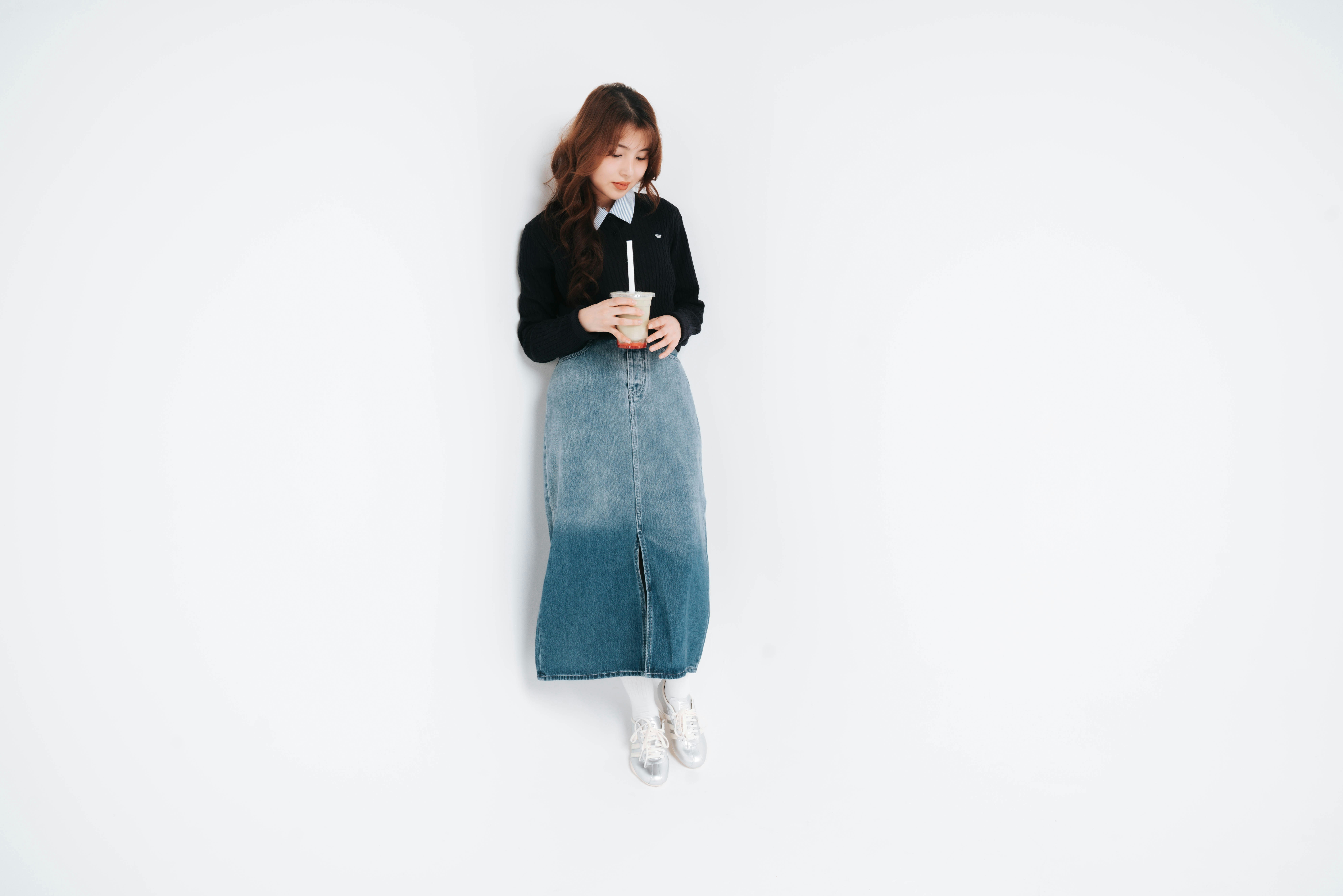 Minimalist Portrait: A Quiet Moment in White Space