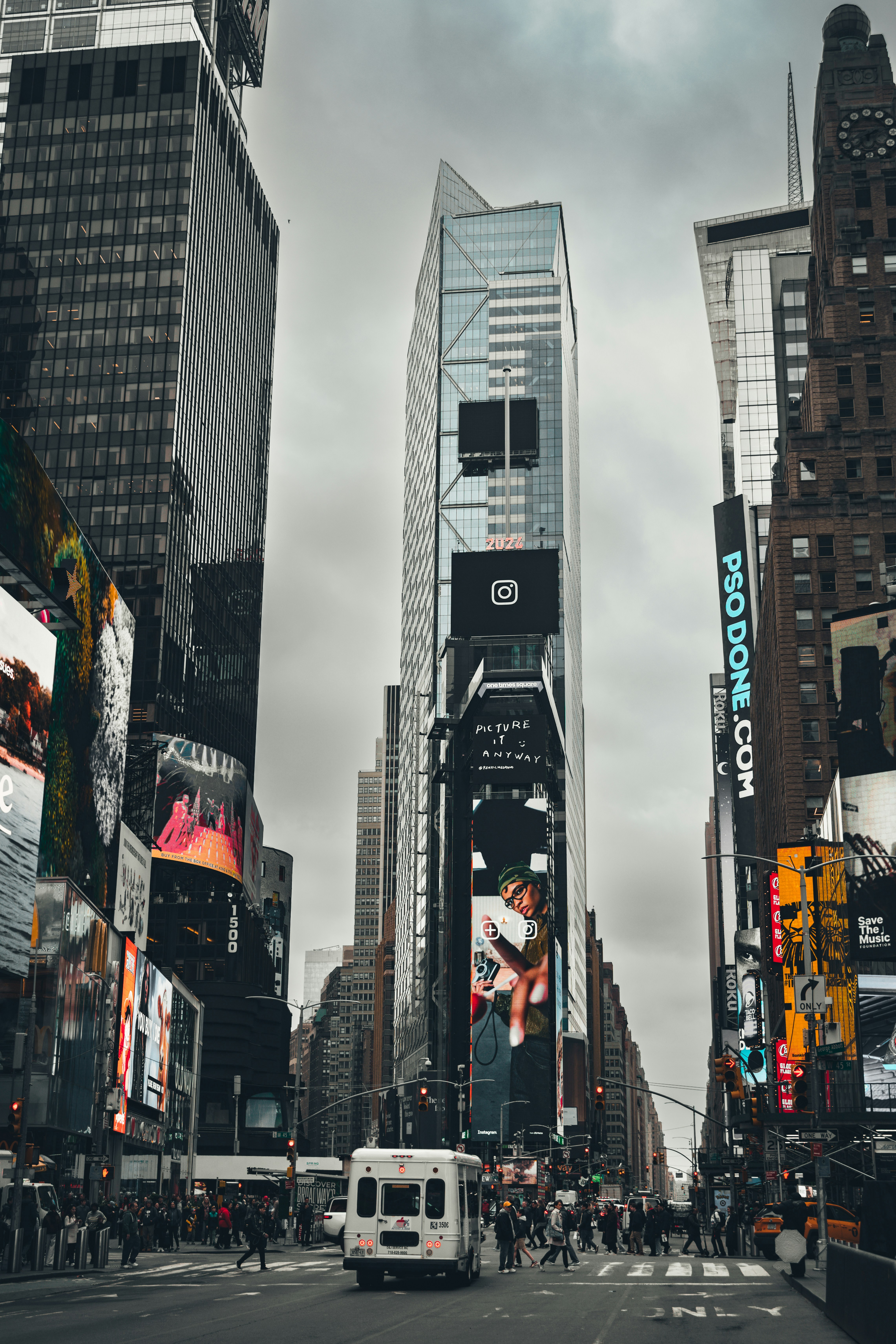 New york city street with tall buildings and billboards