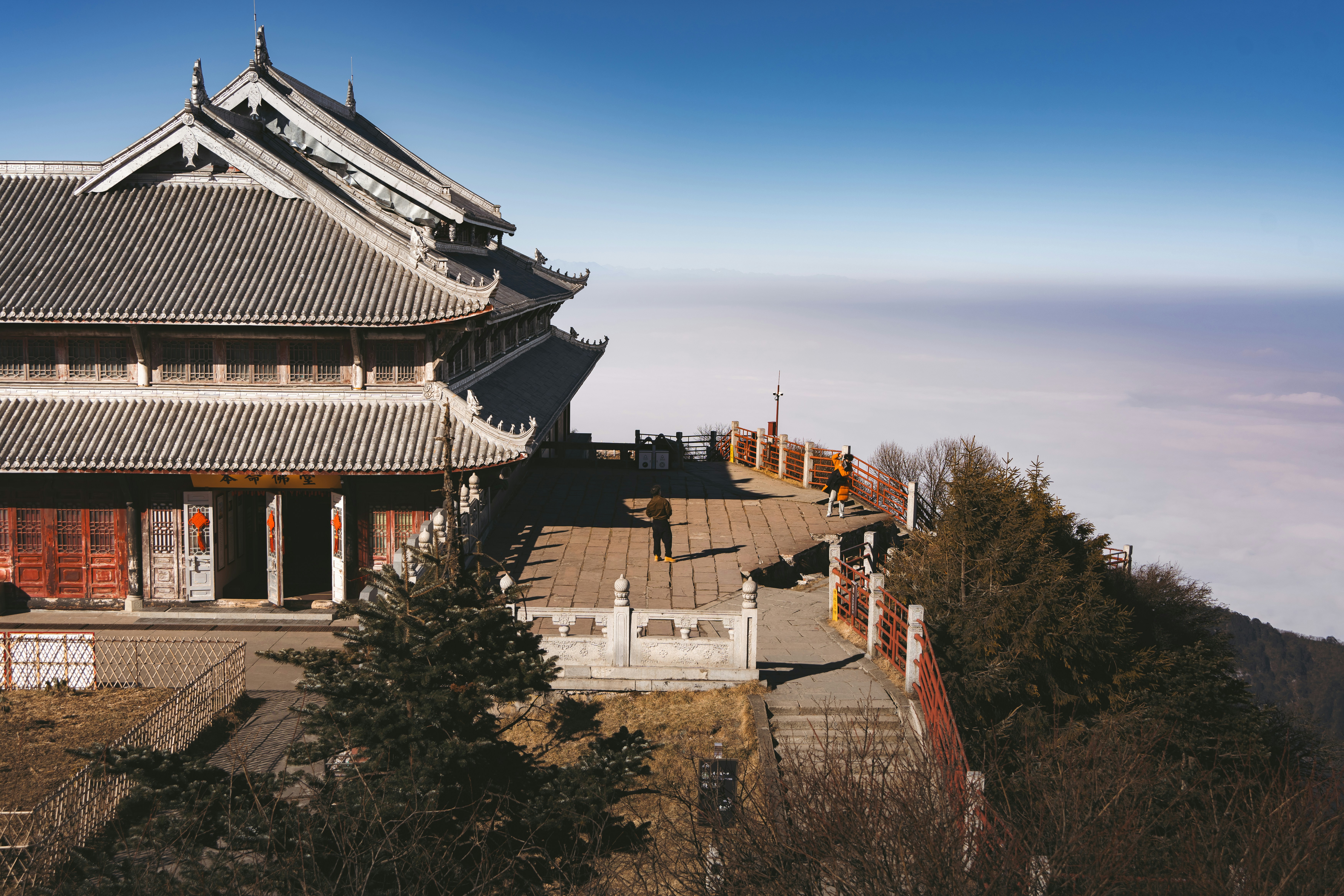Temple Over Clouds: A Mountain Summit View