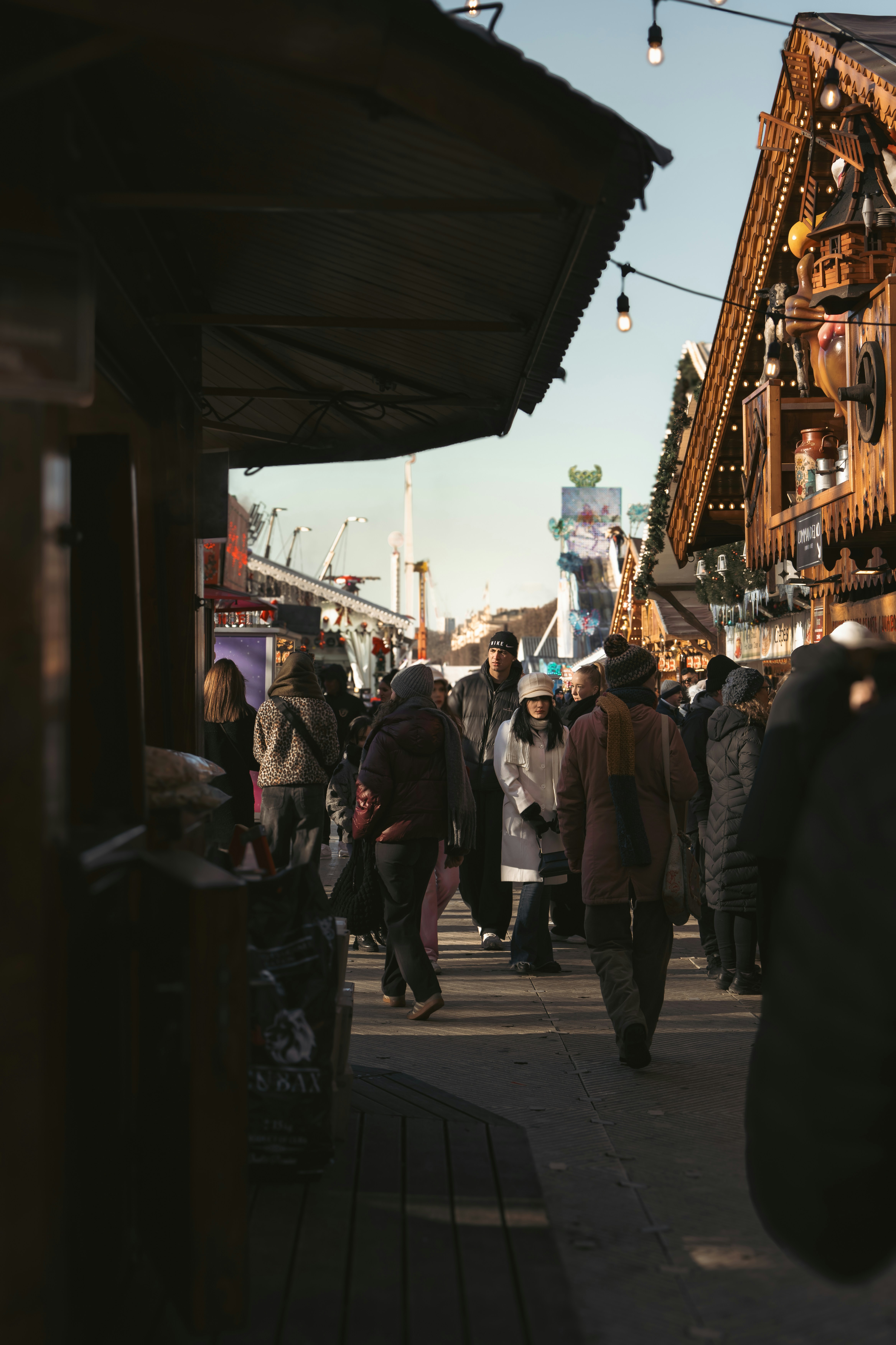 Crowd on a Sunlit Market Street at Dusk
