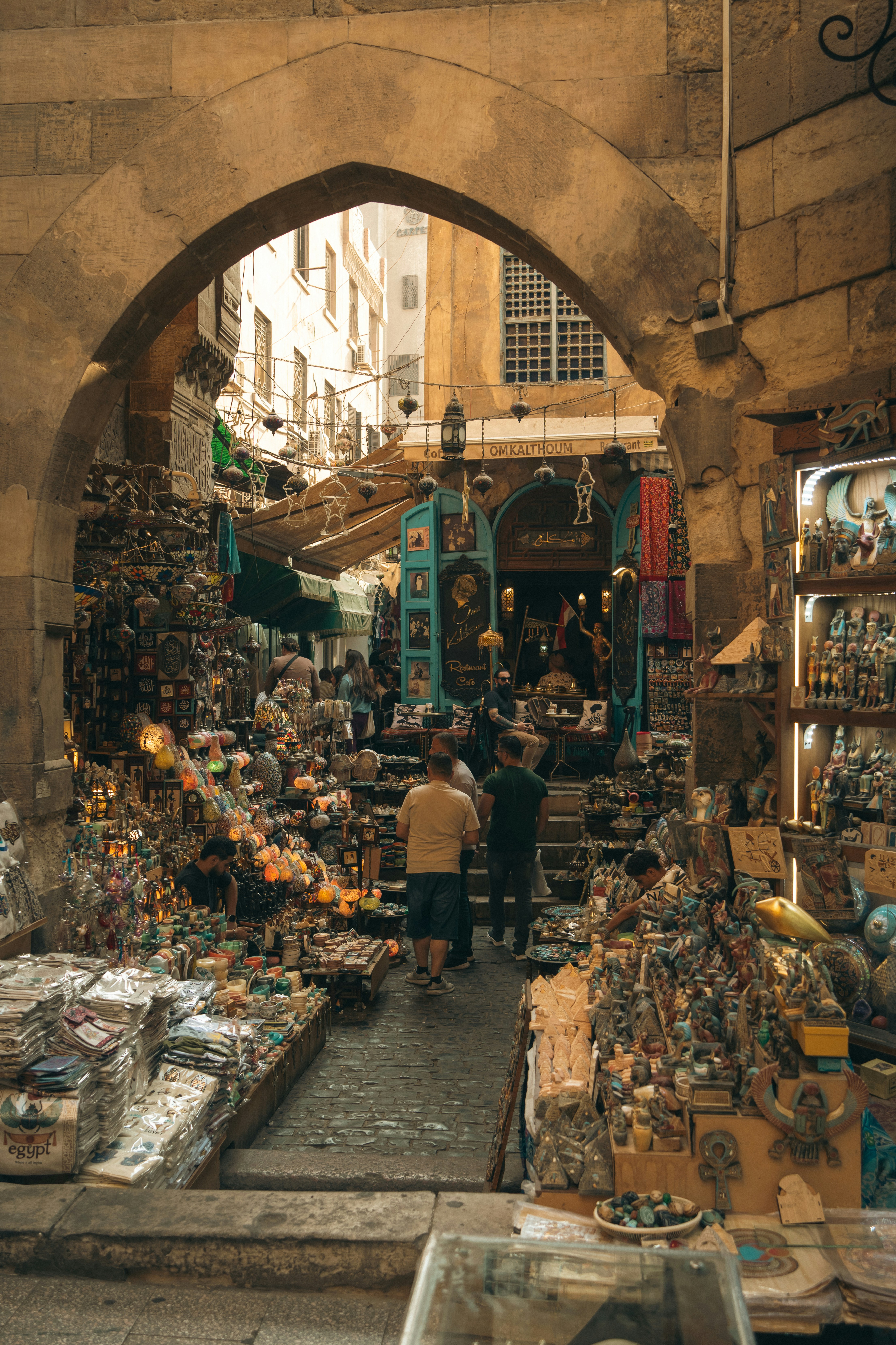 Under the Stone Arch: A Vibrant Bazaar Corridor