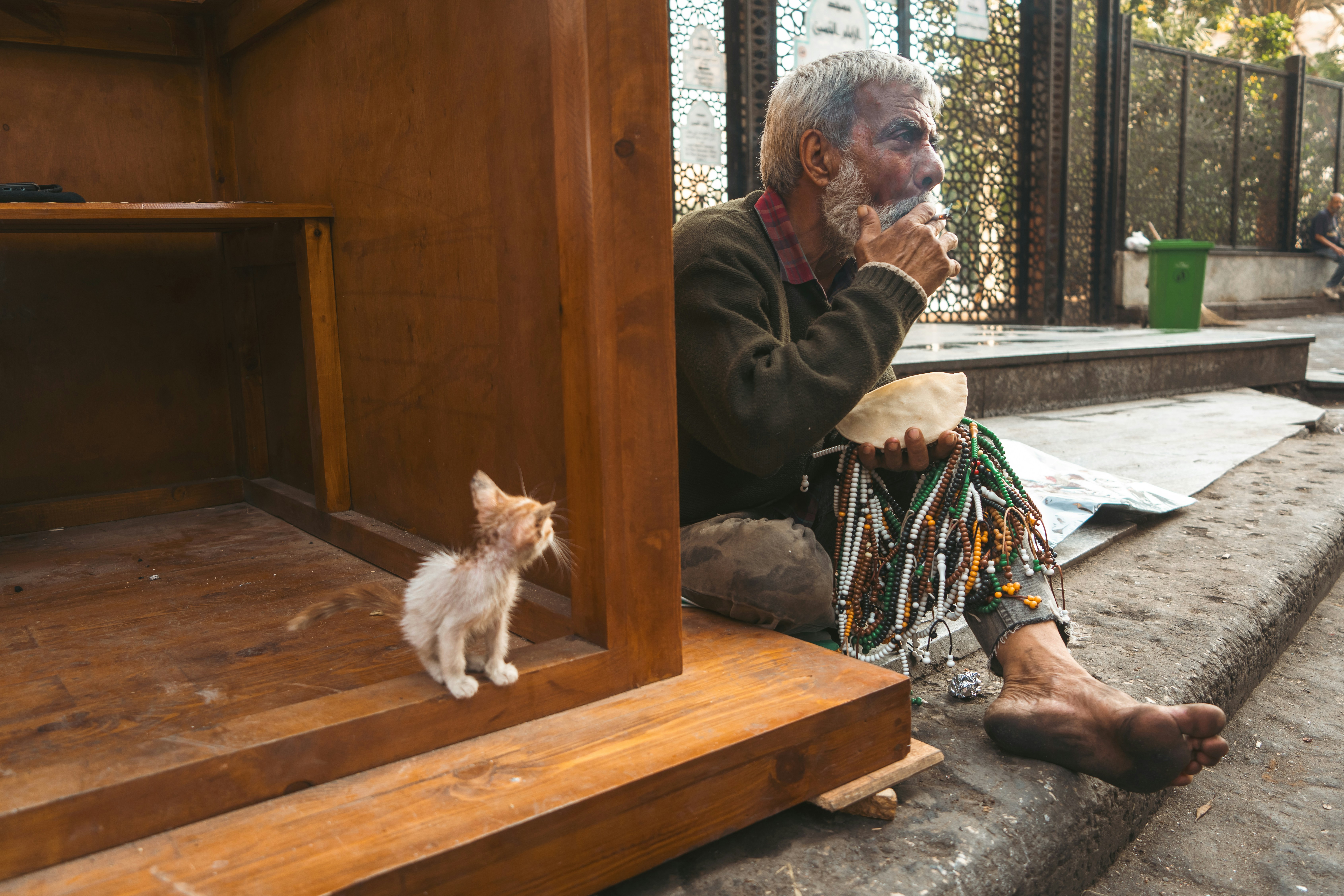 Solitary Respite: A Smoker by the Steps