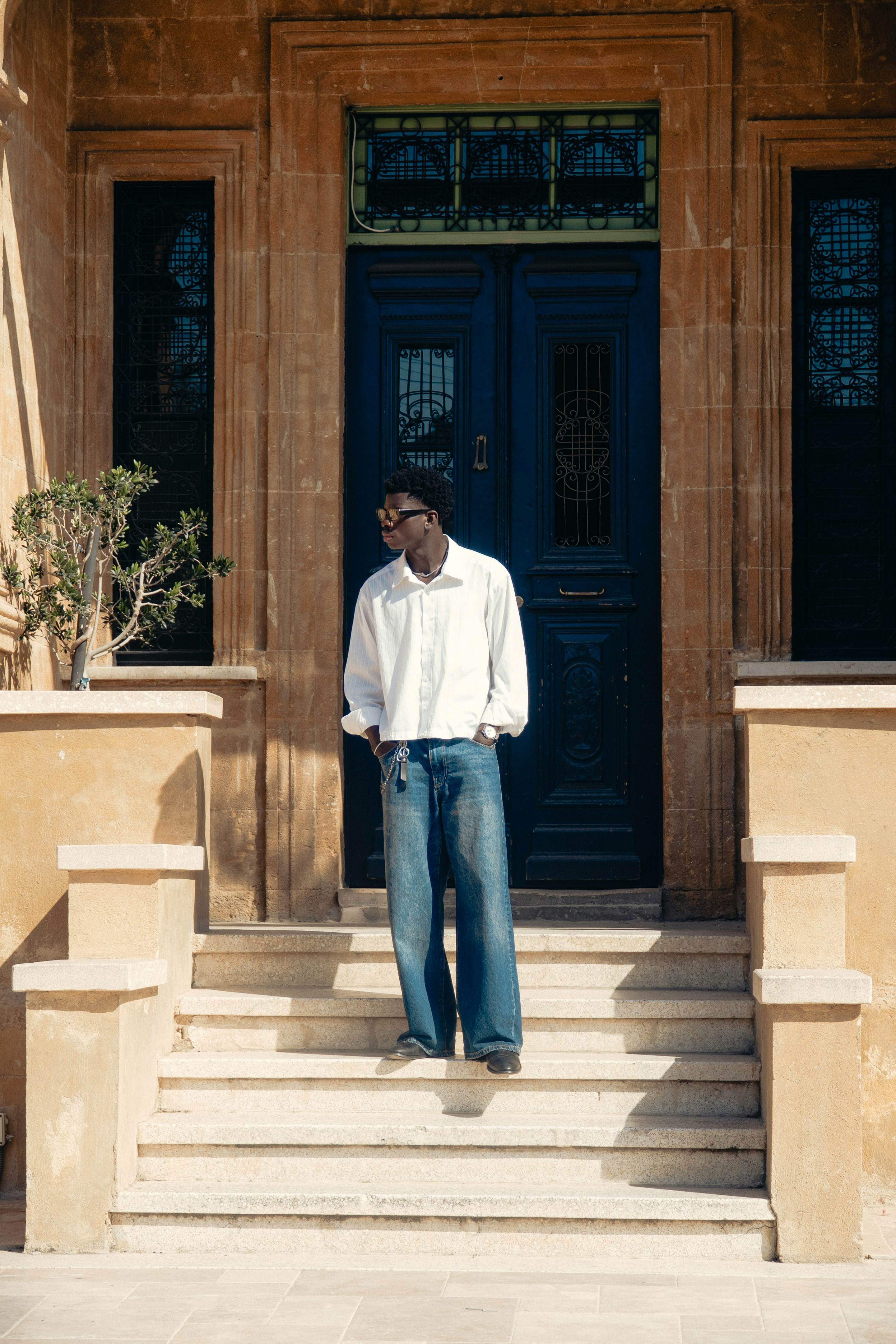 Face in the Framed Doorway: Streetwear on Steps