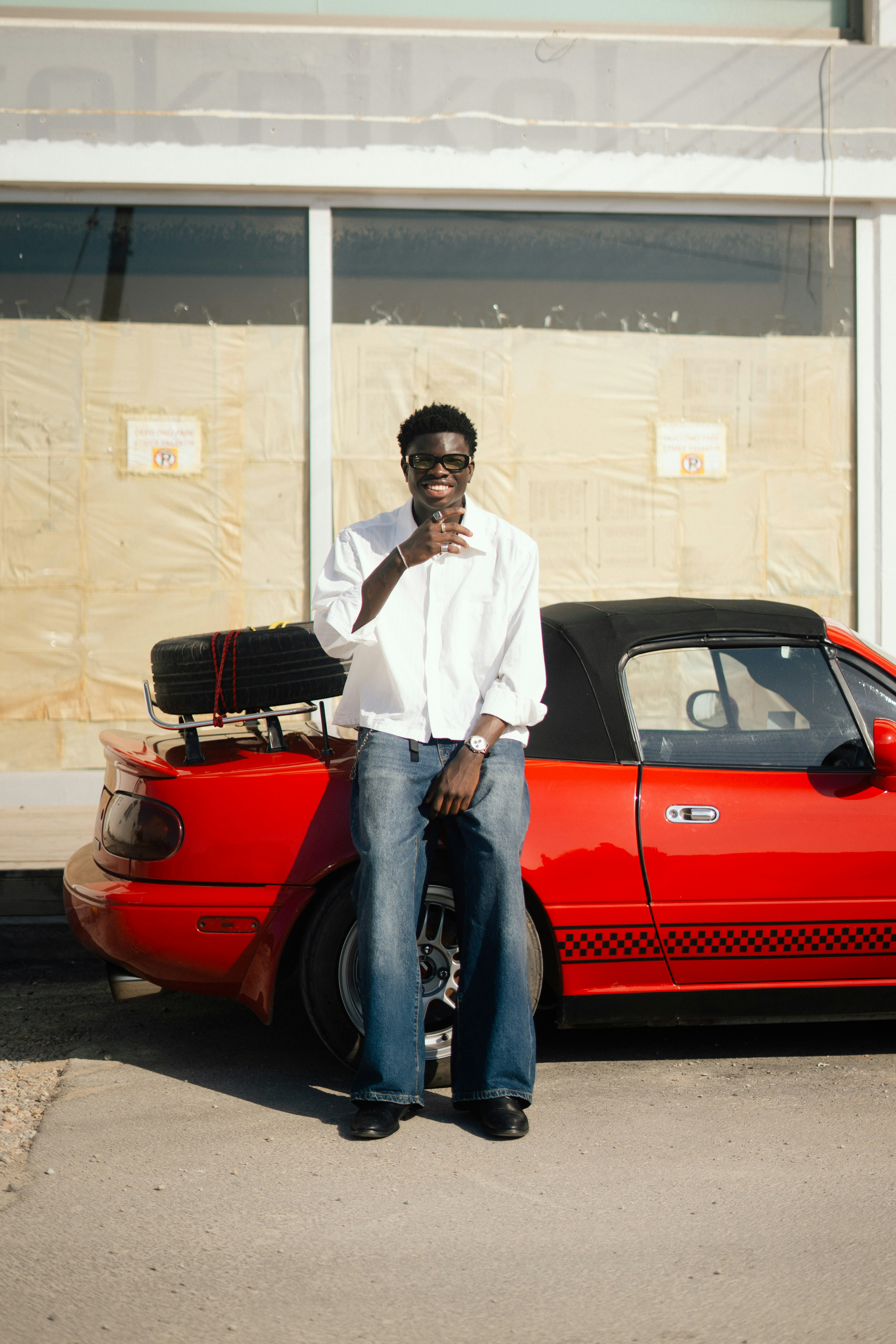 Smile by the Red Convertible