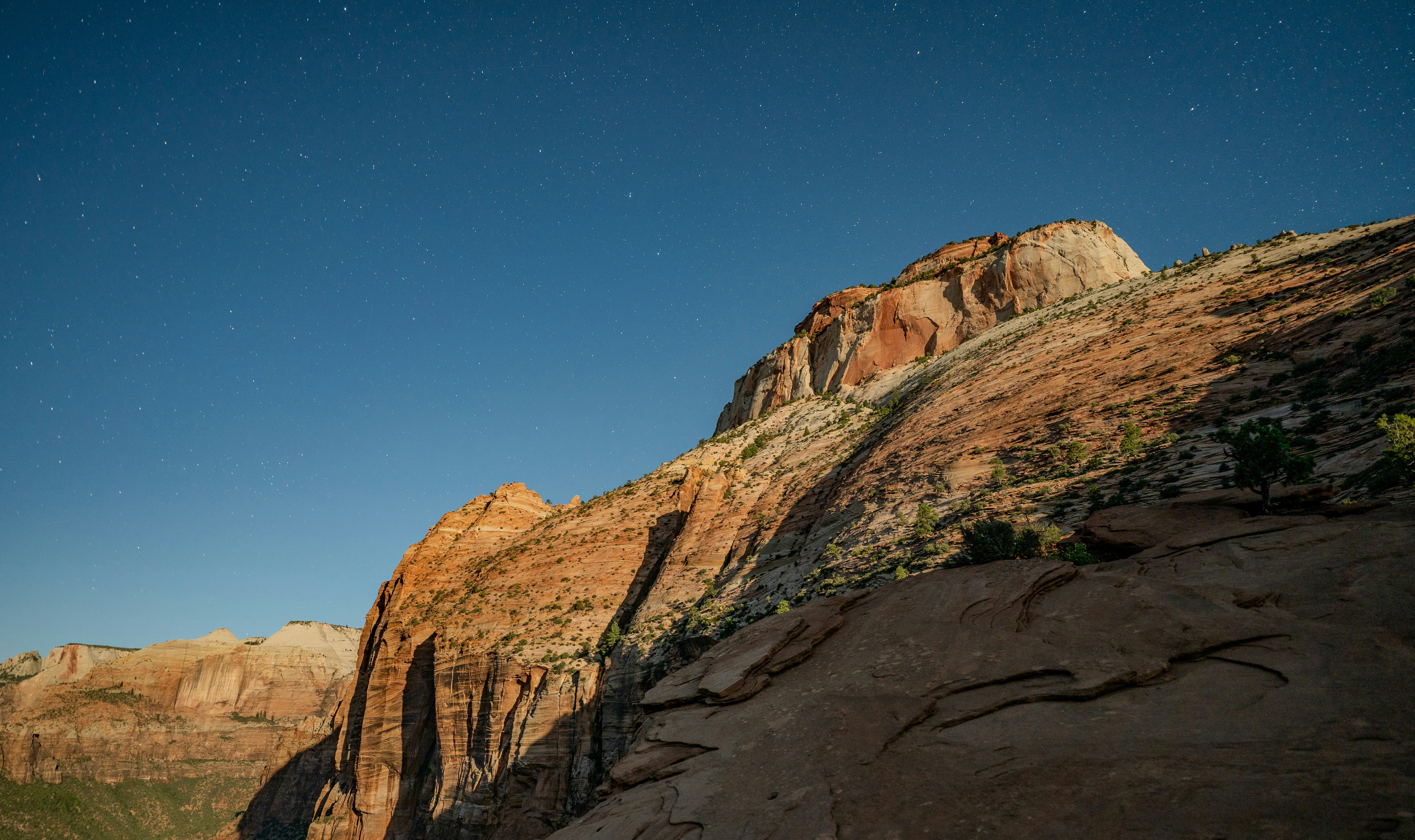Moonlit Cairns Over a Sunlit Mesa