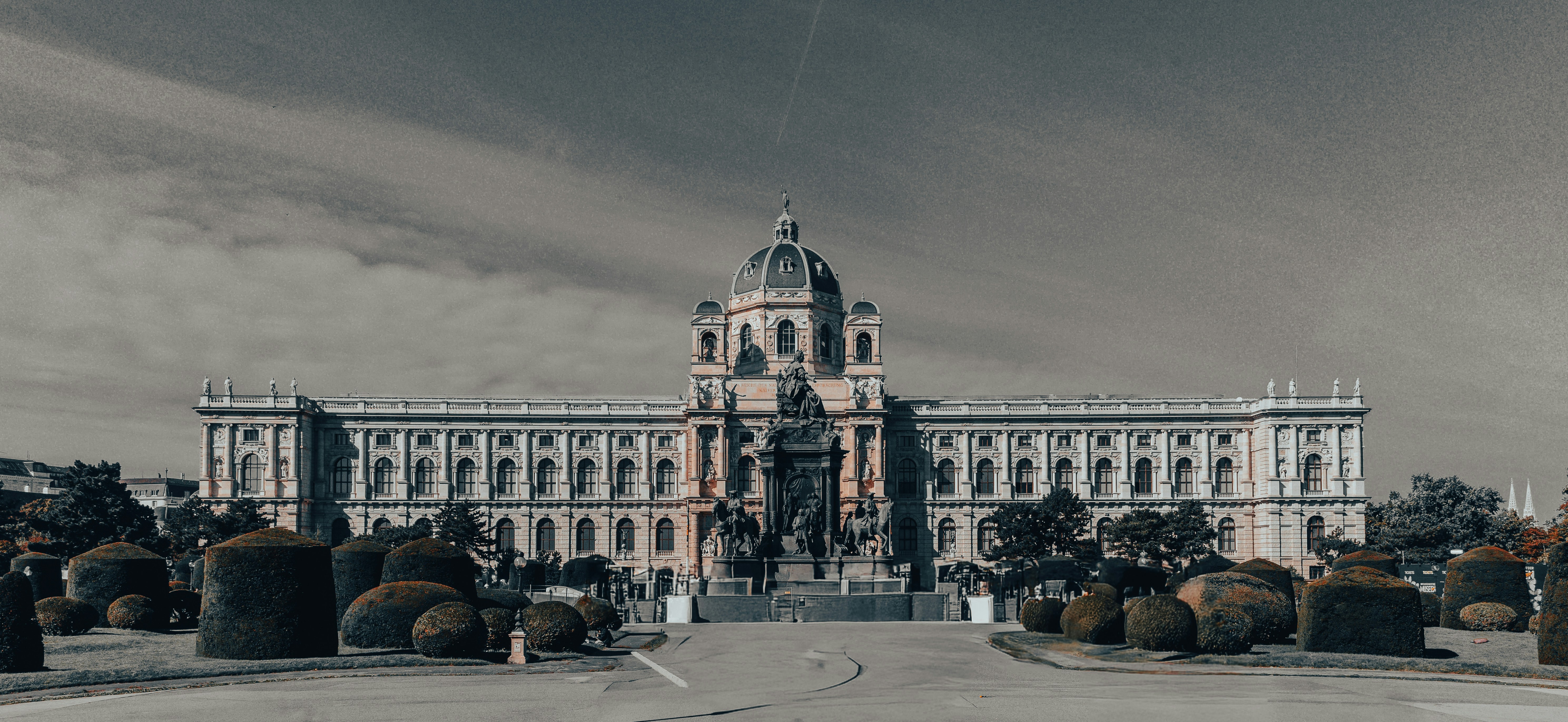 Monumental Beaux-Arts Facade Framed by Sculpted Gardens