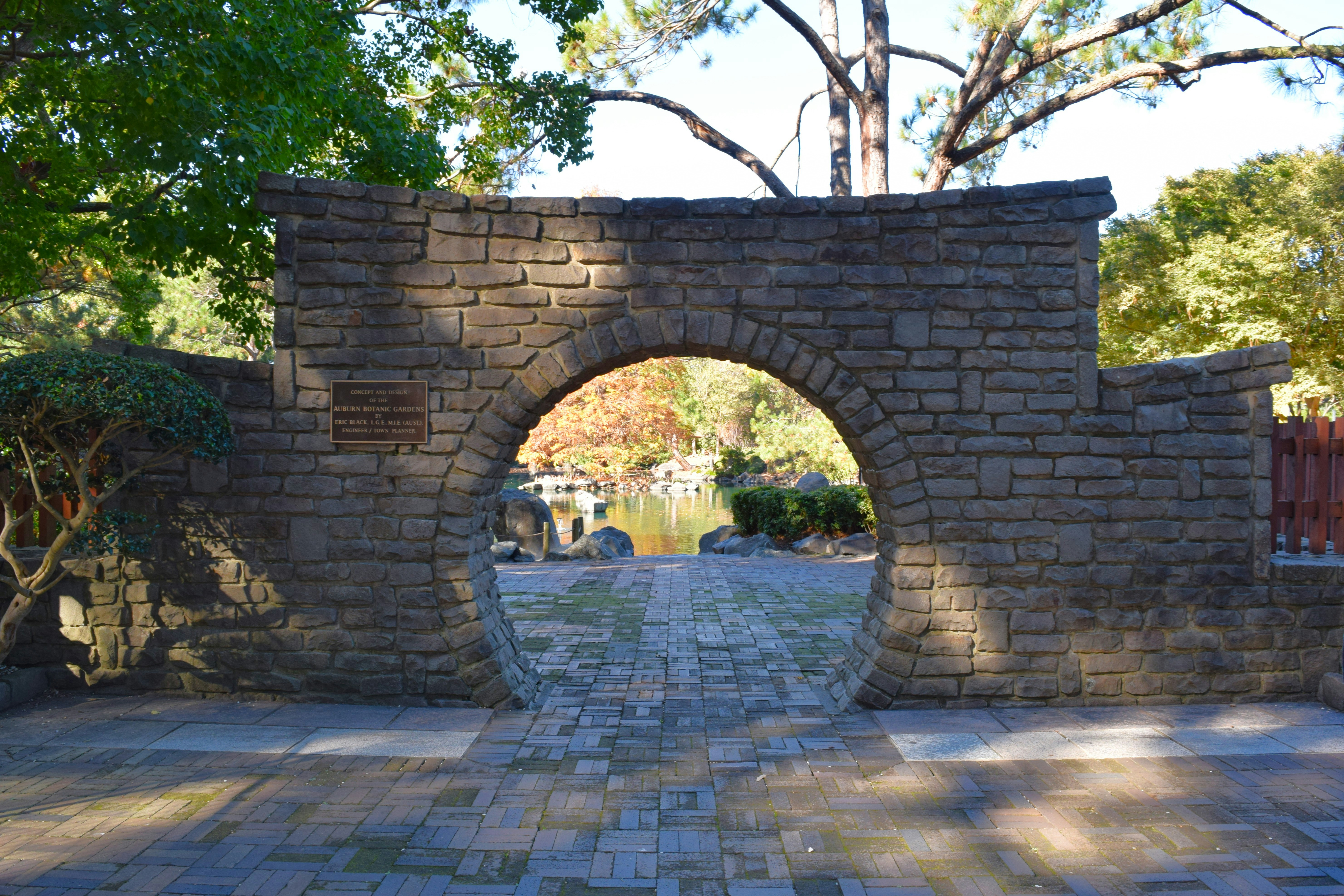 Circular Stone Gate Opens to a Quiet Courtyard