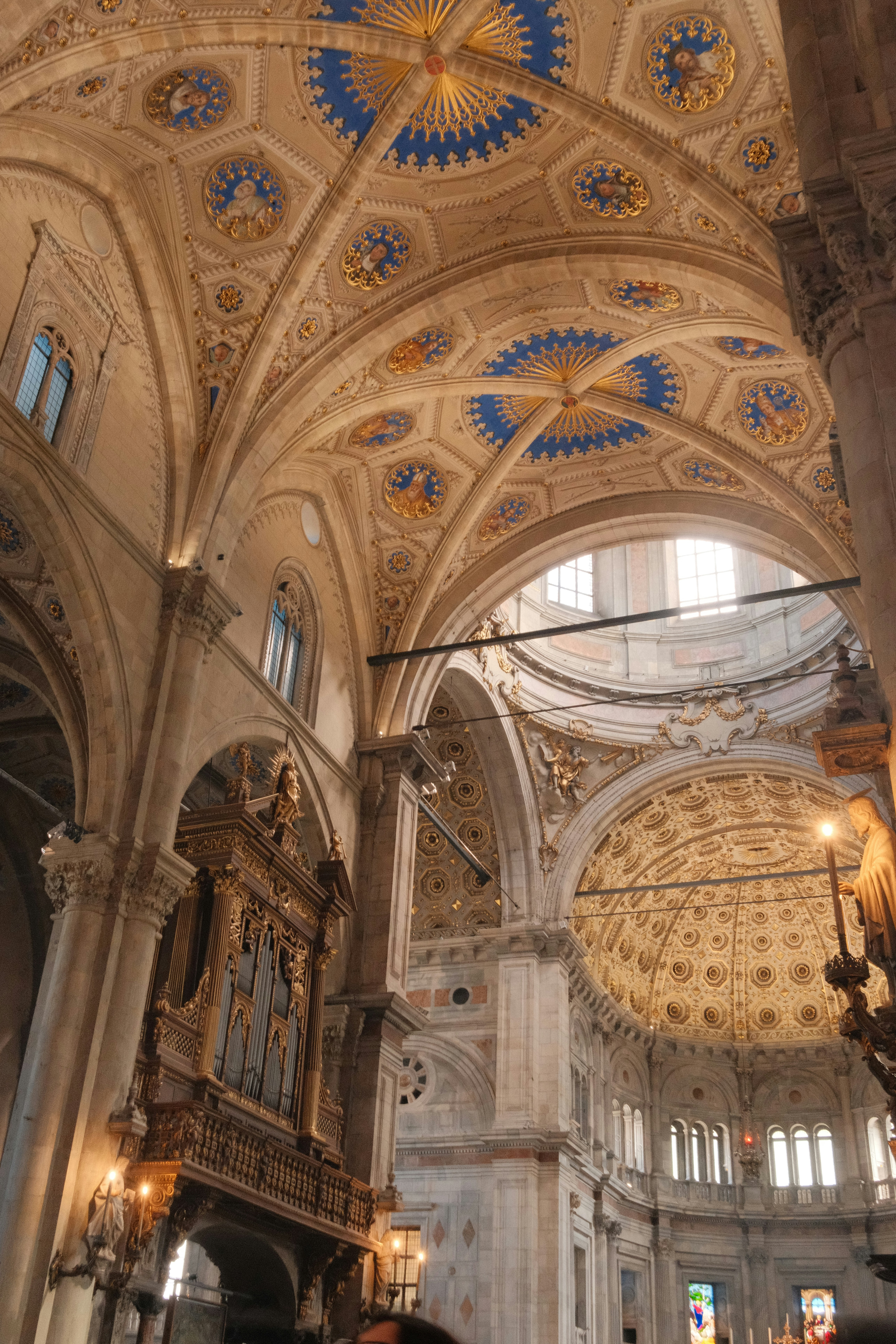 Ornate Cathedral Vaults: Light, Stone, and Gold in a Sacred Interior