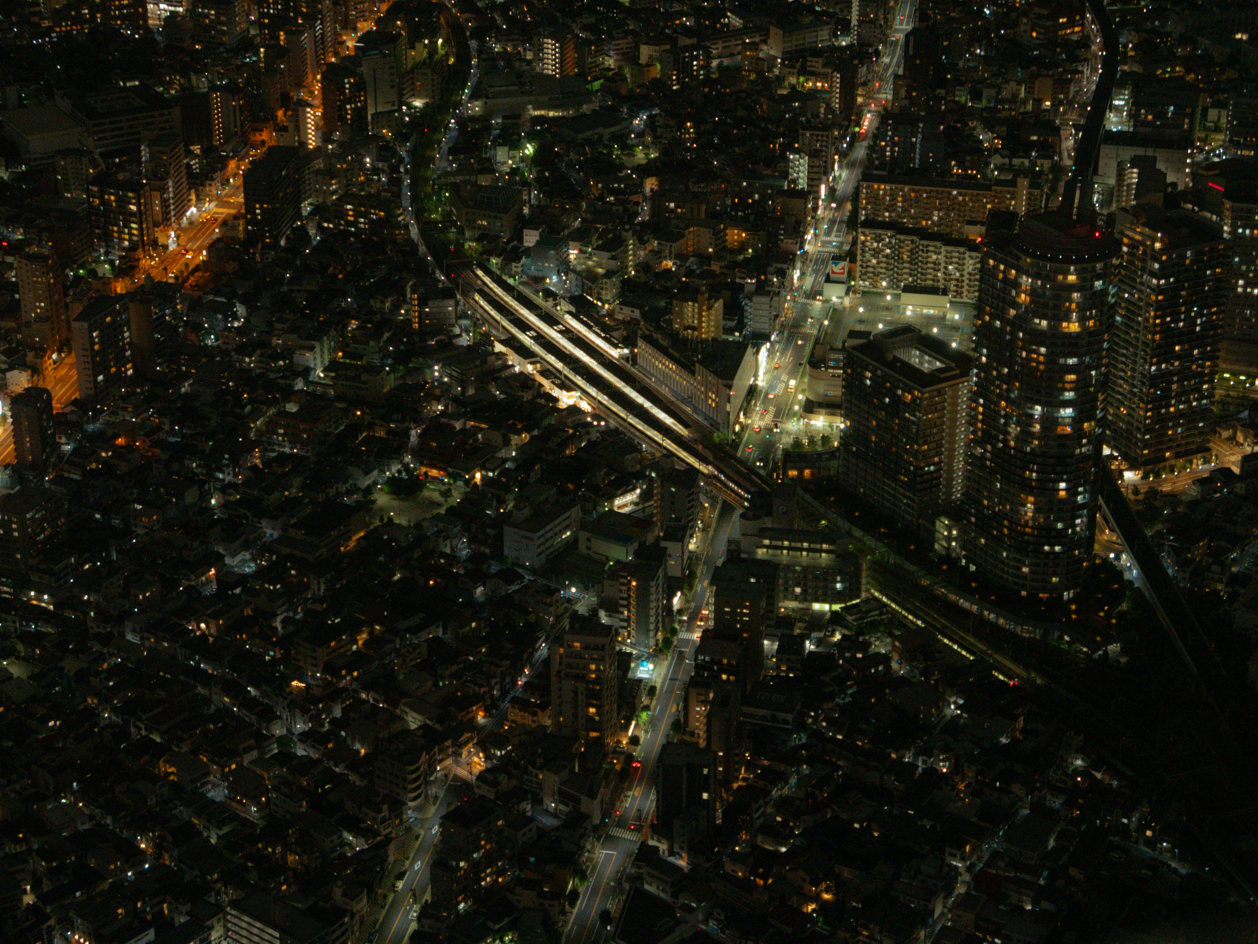 Midnight Convergence: A City Spinal Highway Weaving Through Neon