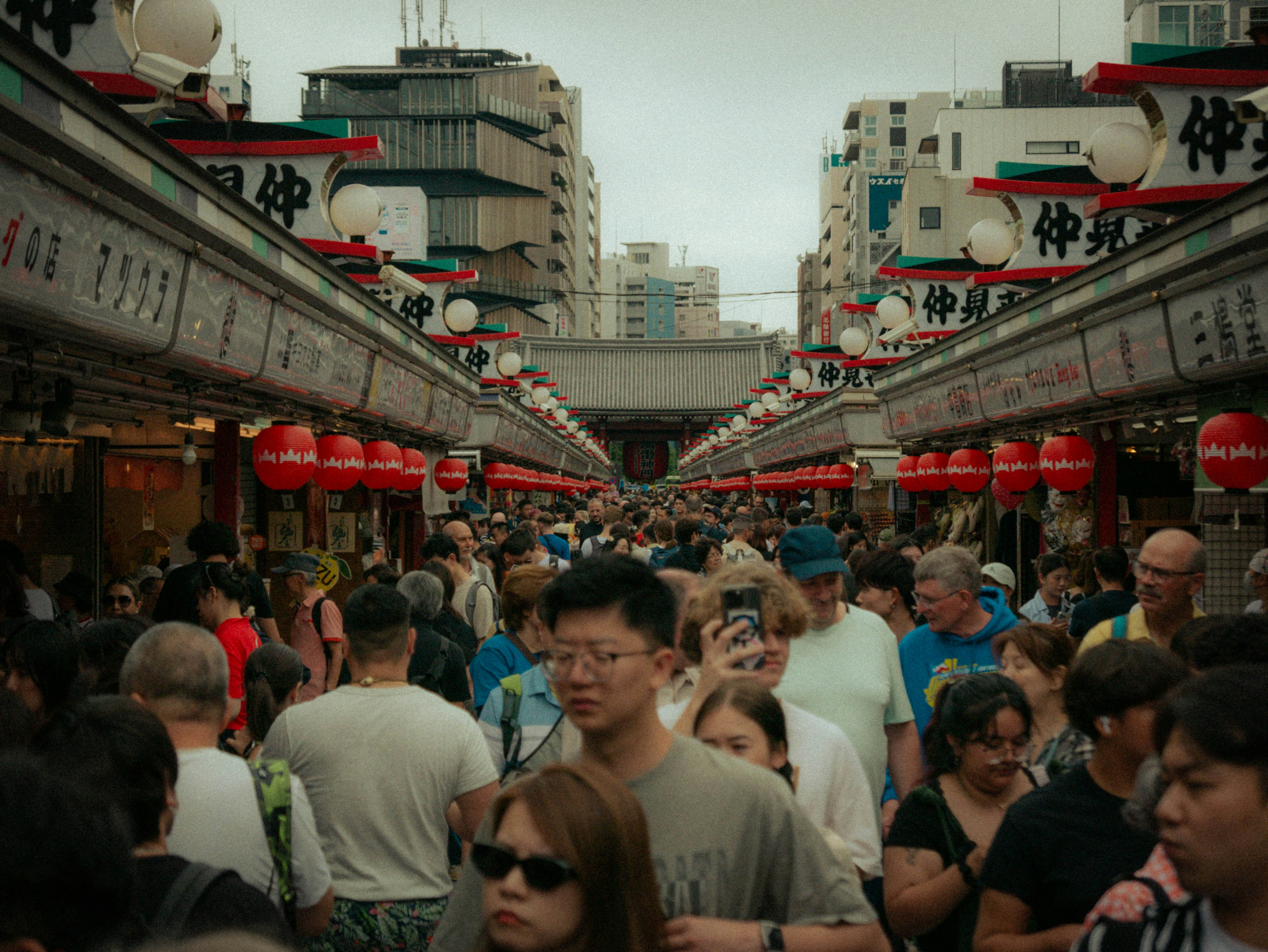 Crowd at a Lantern-Lined Market: Faces in the Alleyway