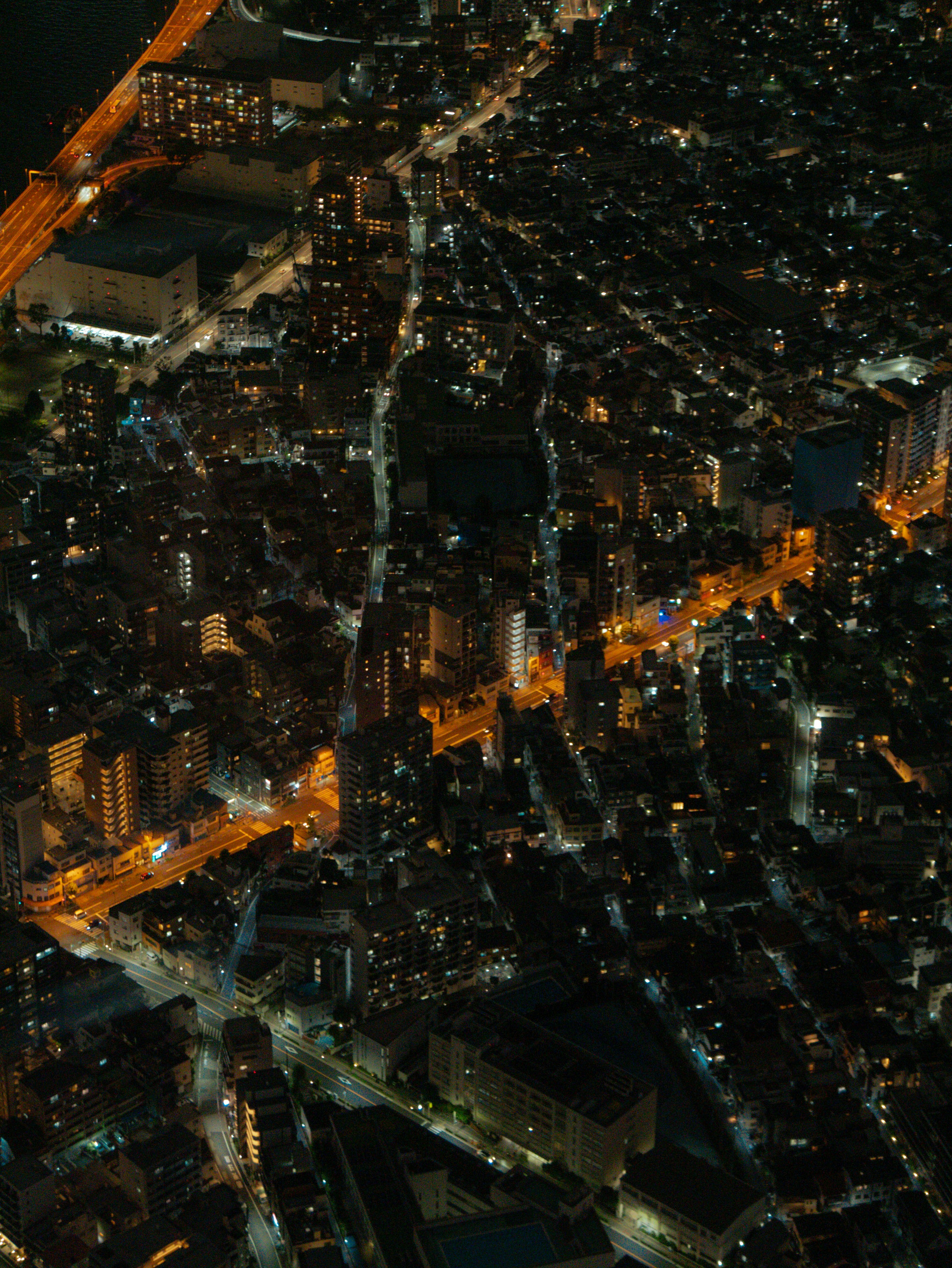 Neon Lattice: A Night Flight Over the City Grid