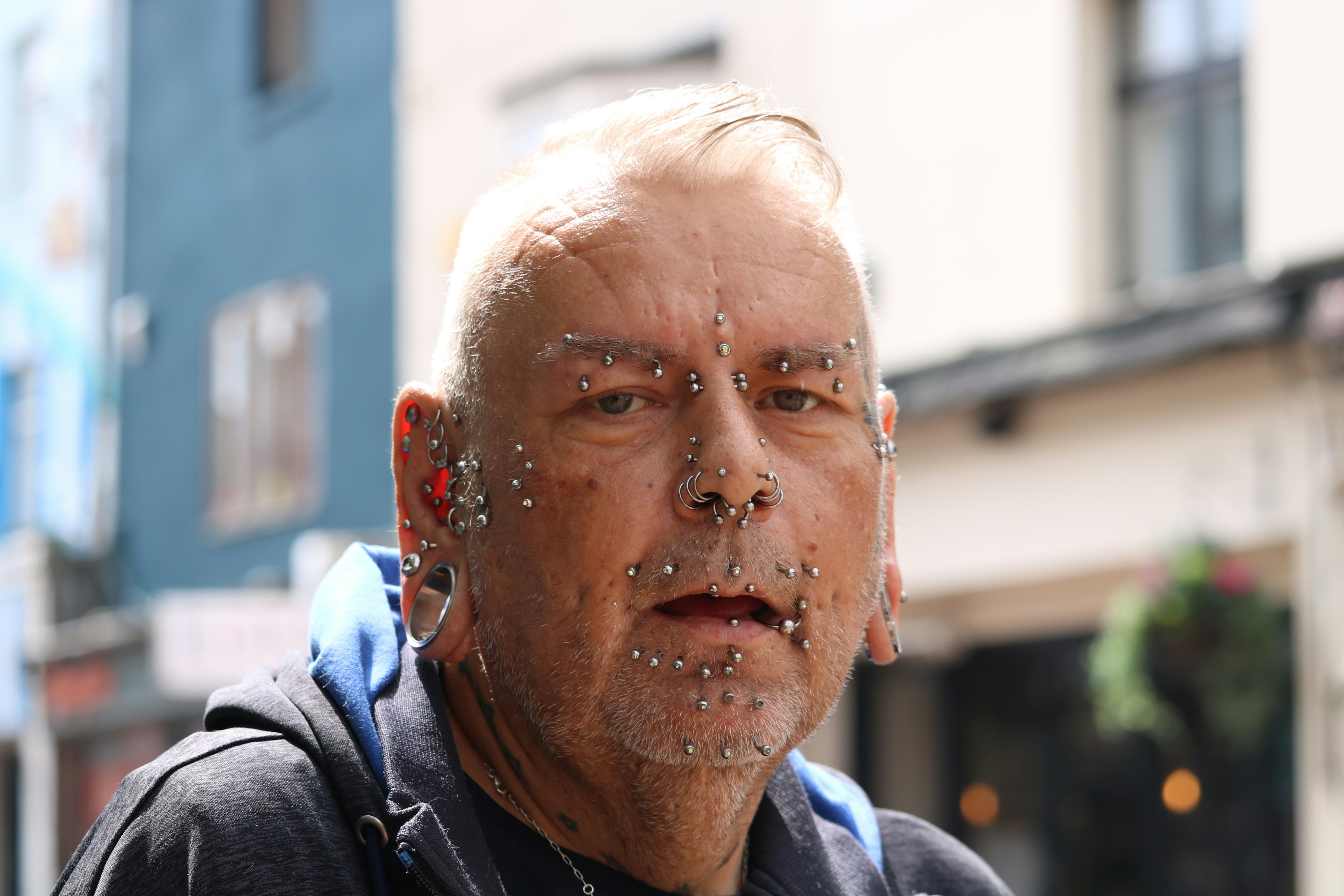 Metallic Gaze: Piercings and Confidence in the Street Portrait