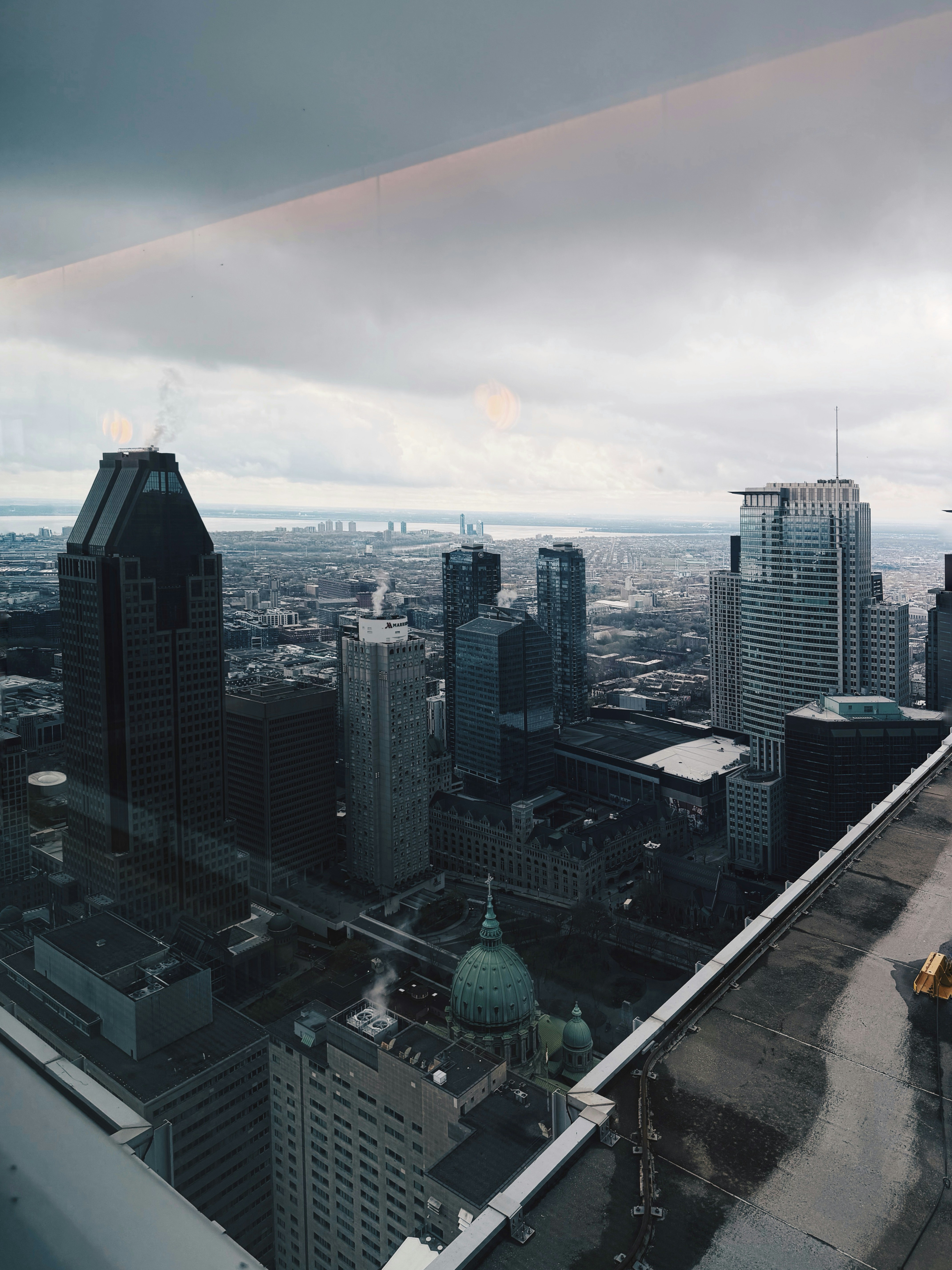 Cityscape Above the Glass: A Window into the Skyline