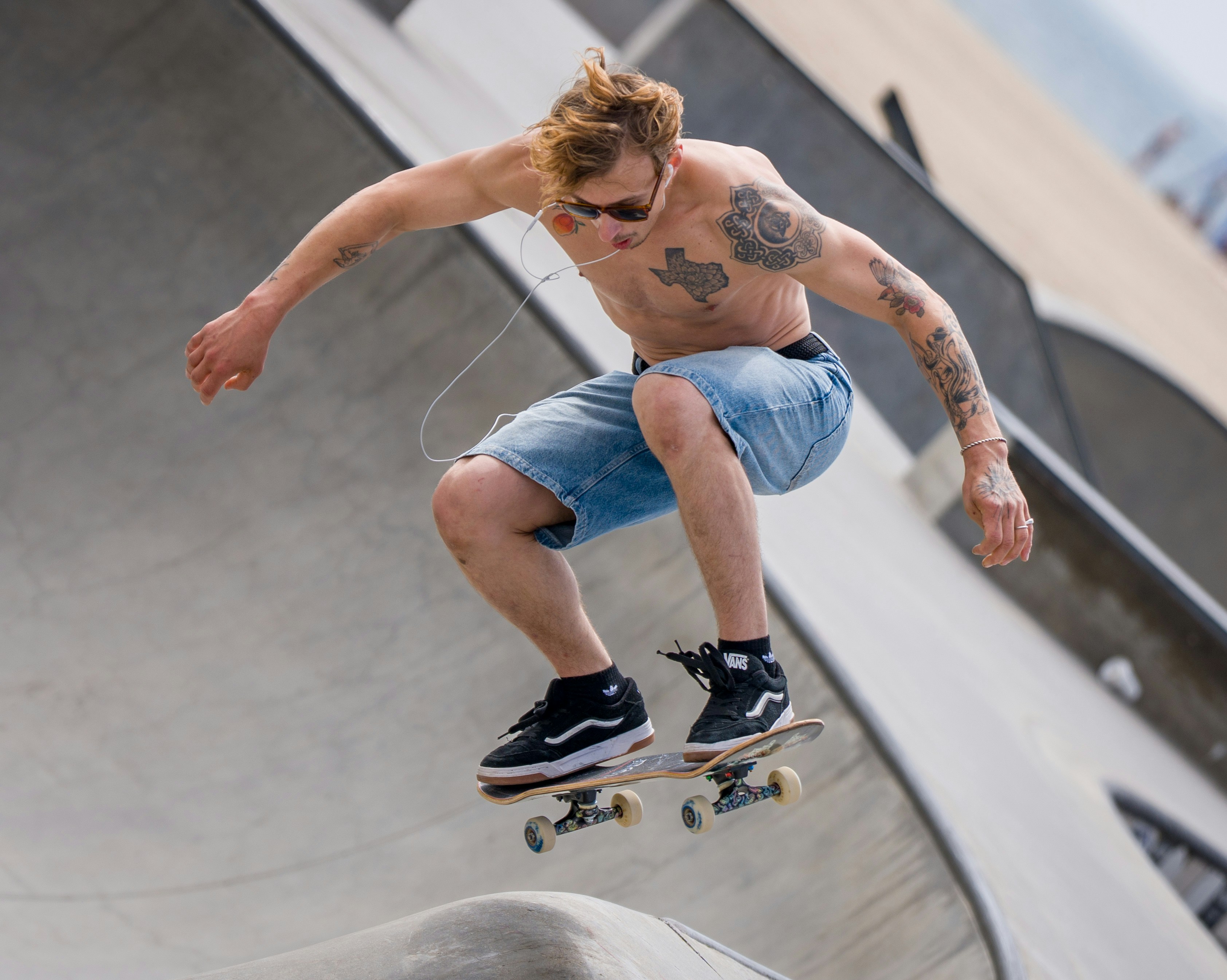 Skater in Flight: Tattoos and Tilt at the Bowl